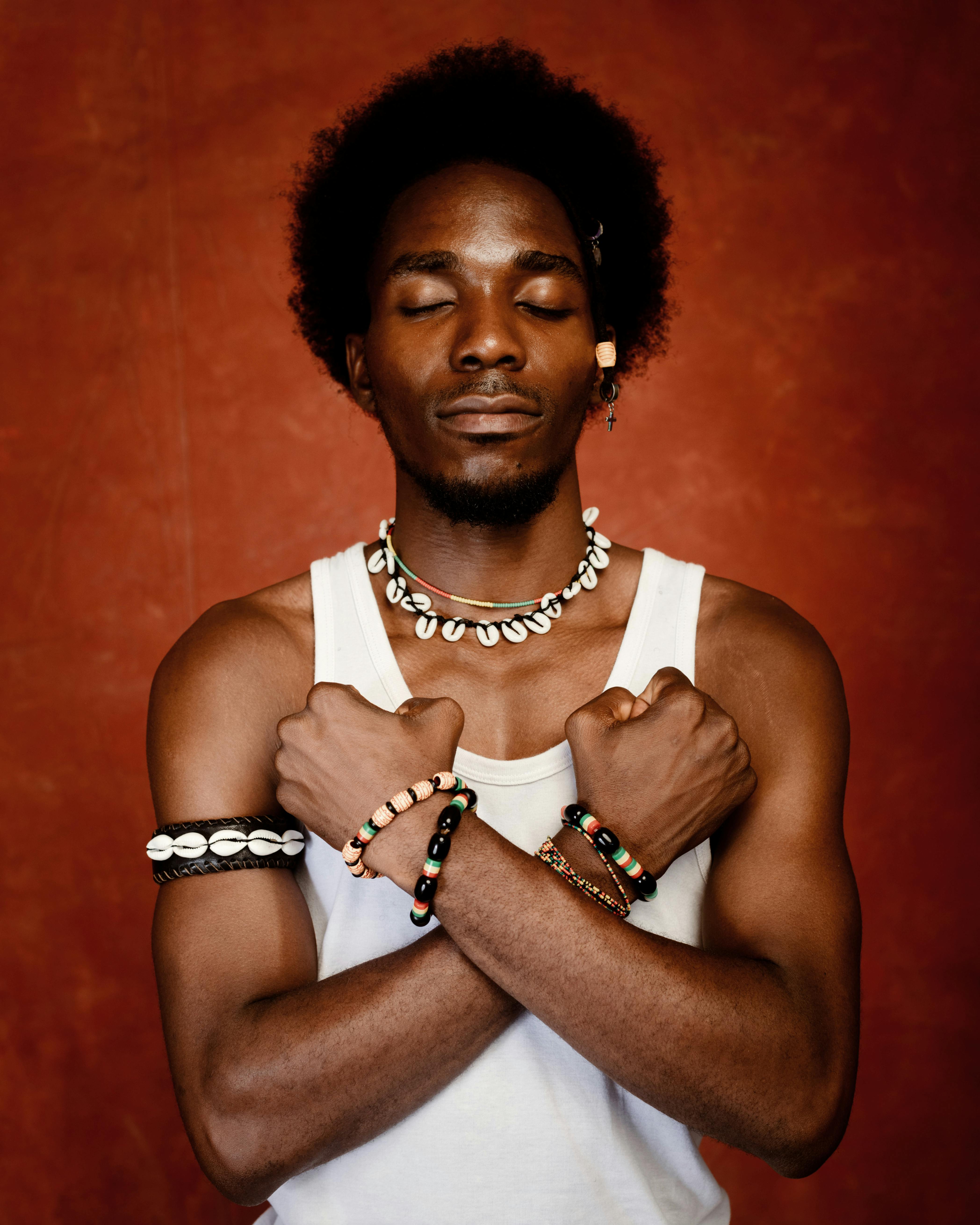 Man with Arms Crossed over Chest and Eyes Closed · Free Stock Photo