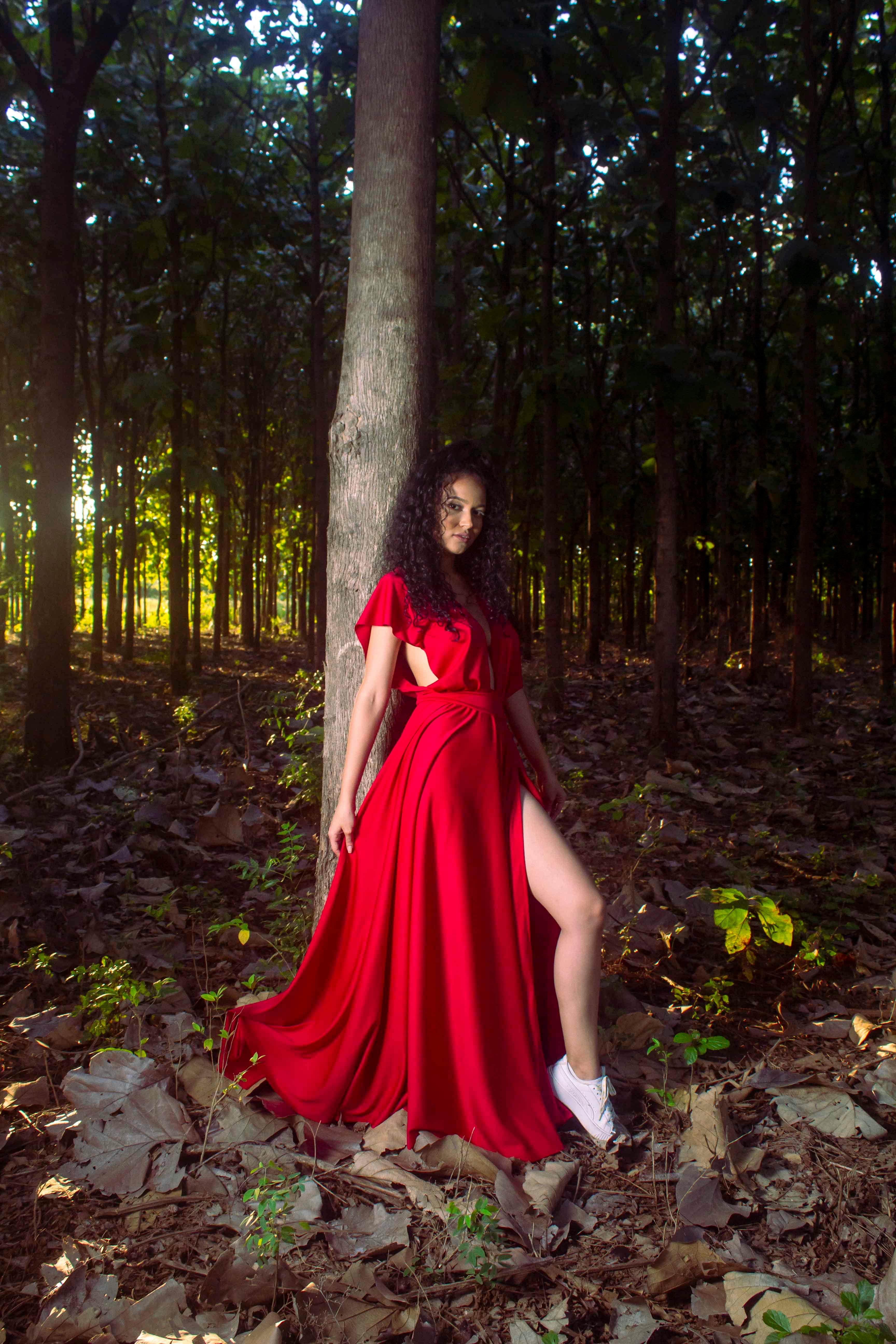 Model Wearing Red Dress in Forest · Free Stock Photo