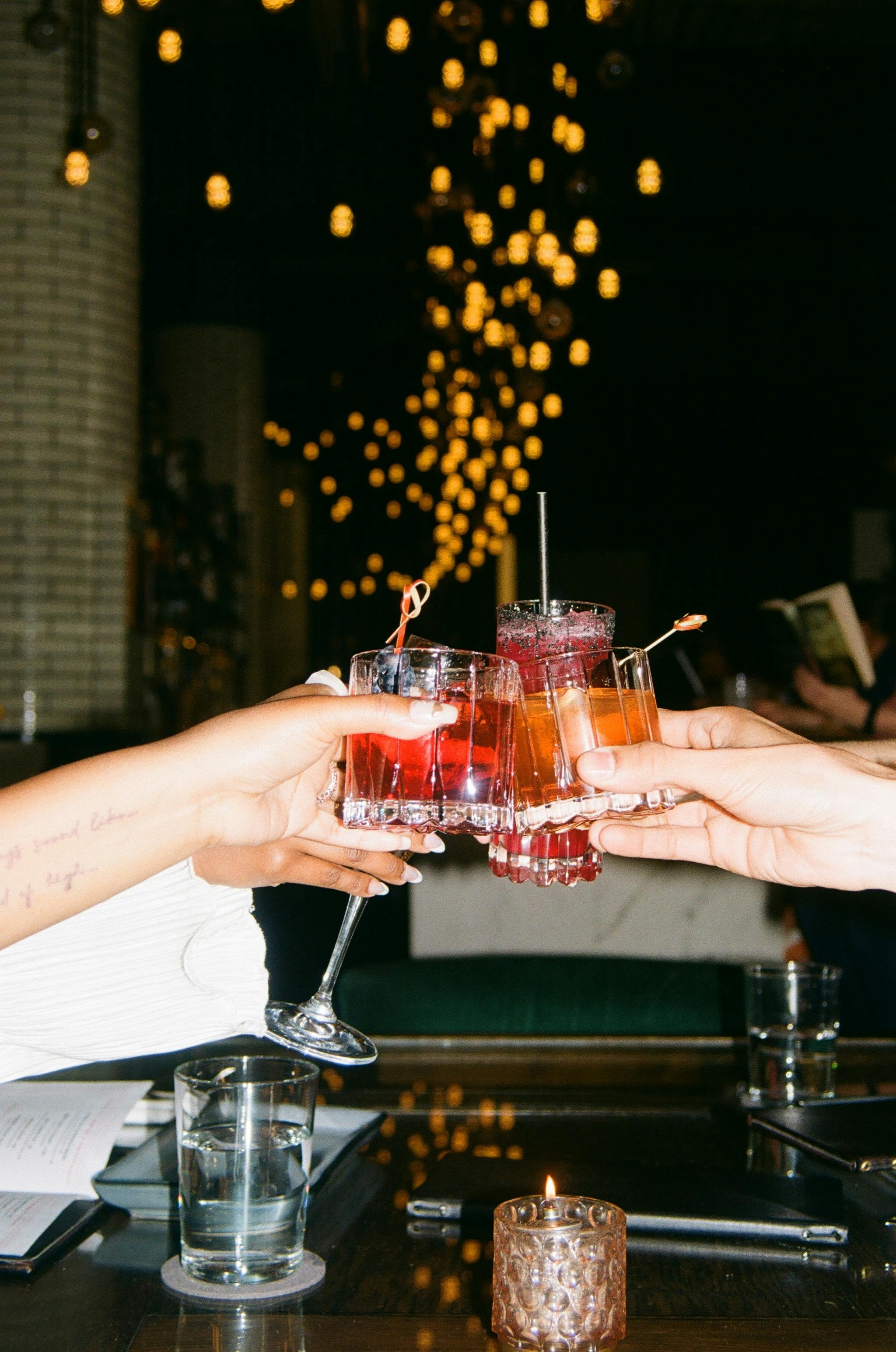 Raising a Toast at the Bar · Free Stock Photo