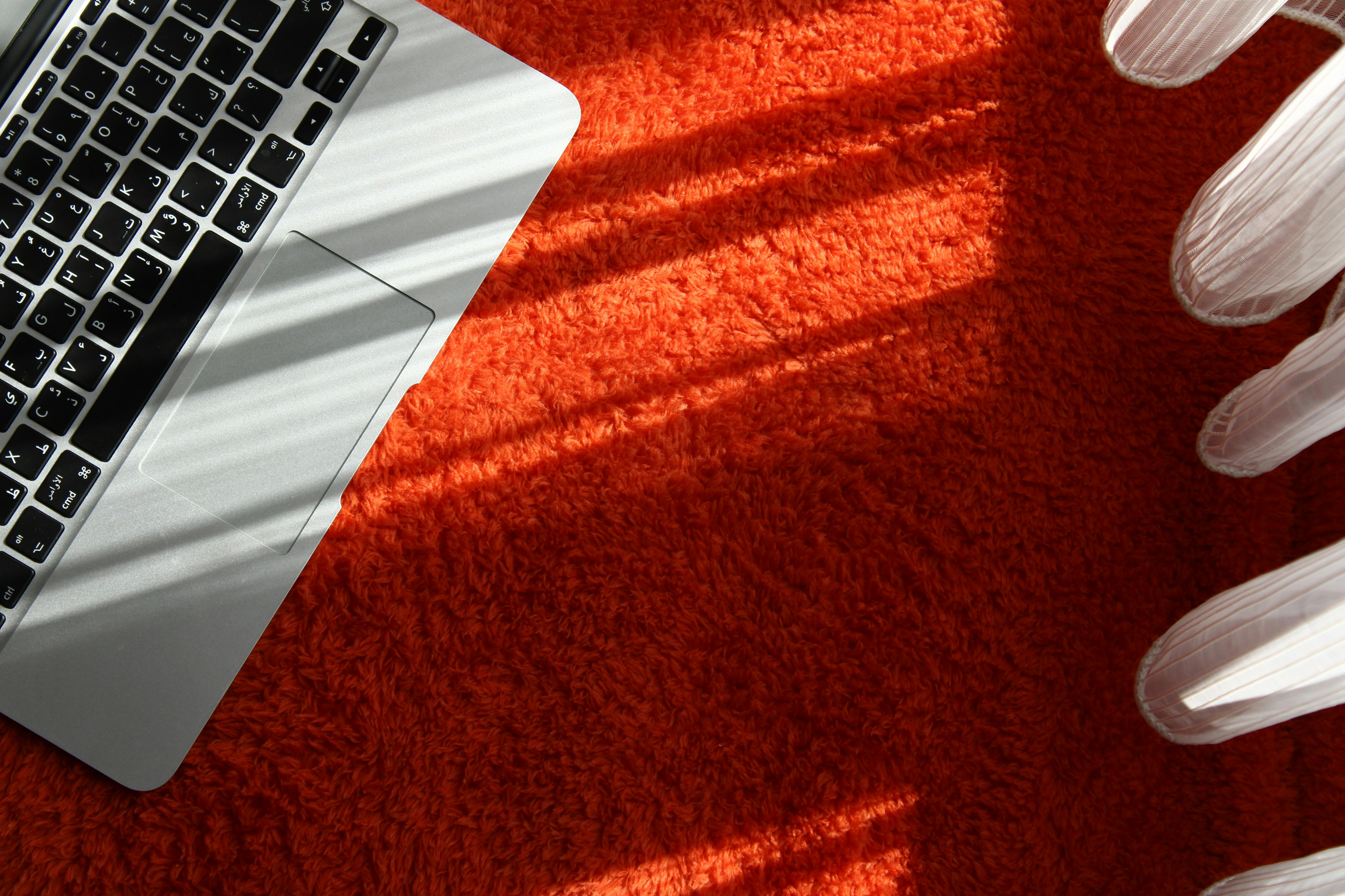 A Laptop on the Floor · Free Stock Photo