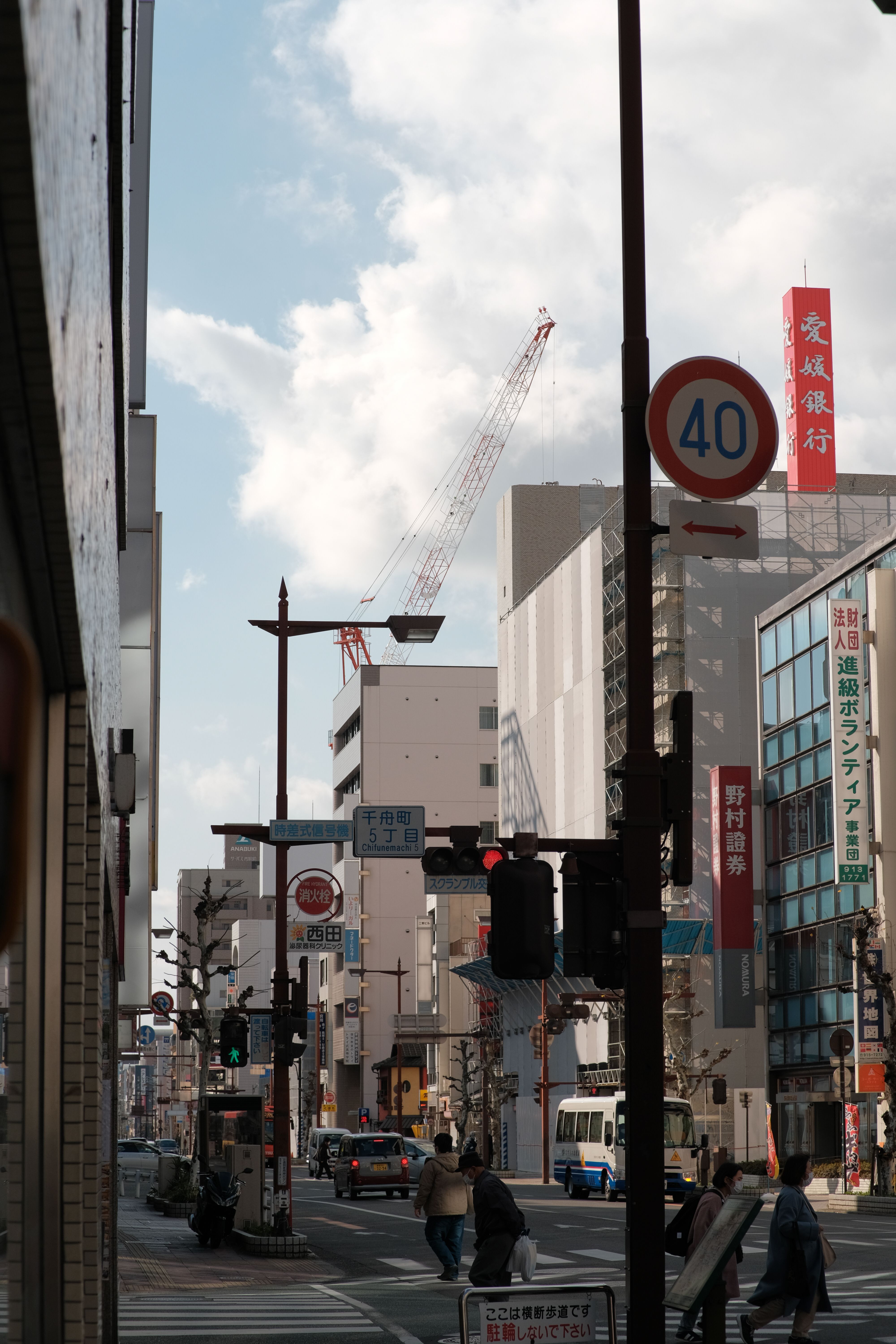 Signs and Buildings of a Busy City Street · Free Stock Photo