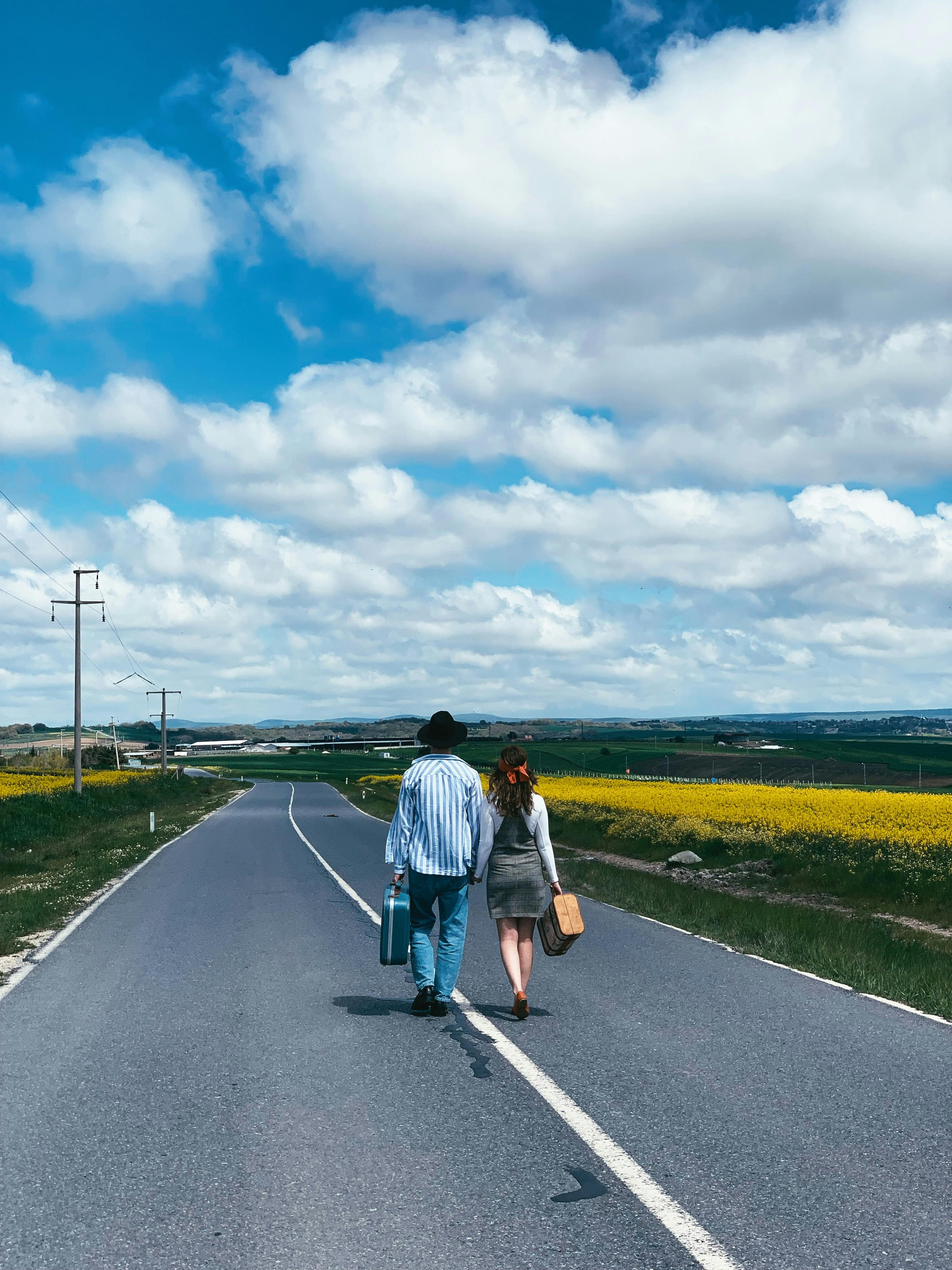 A Couple Walking Down the Road · Free Stock Photo