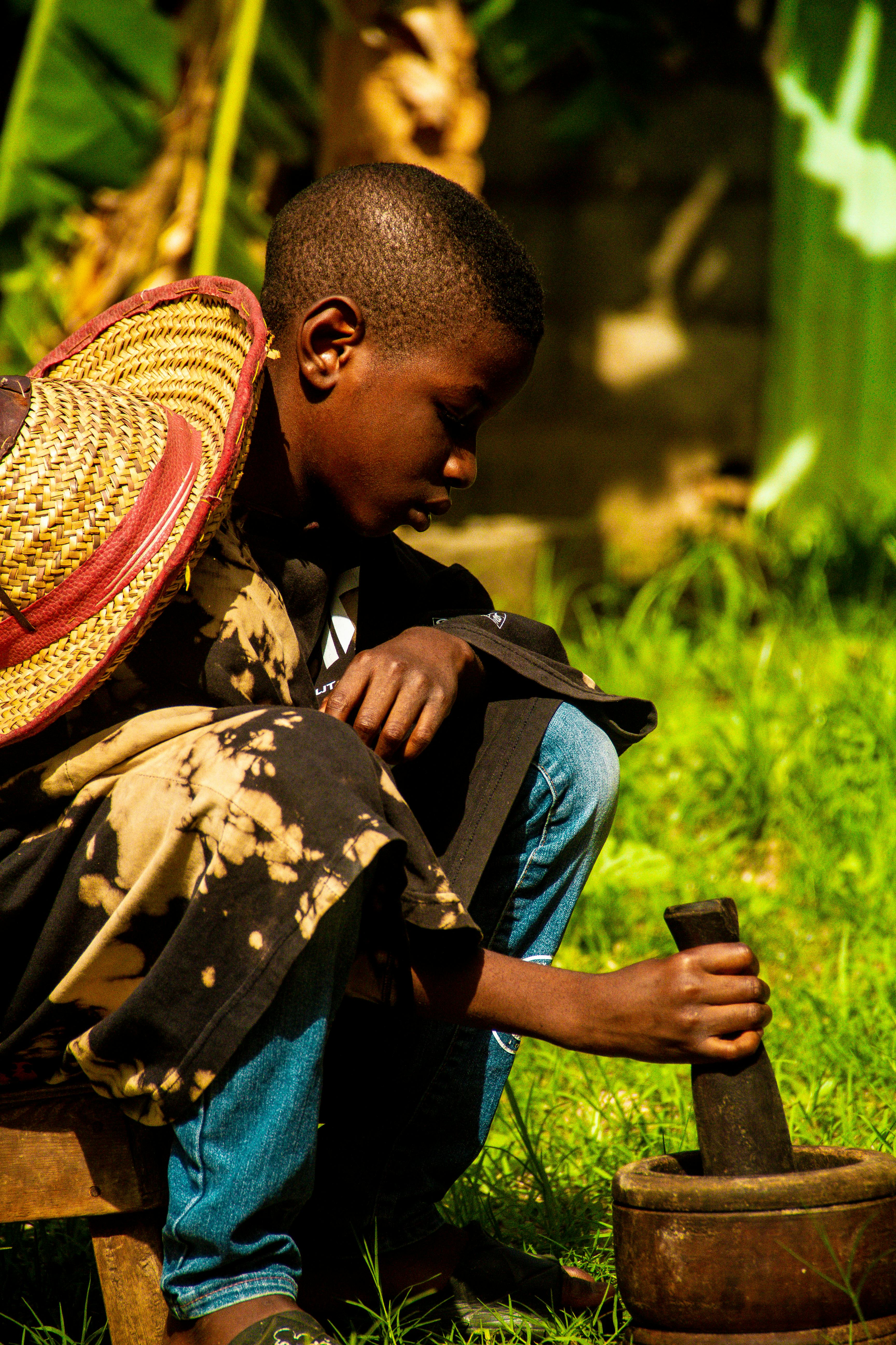 Little Boy with Pestle and Mortar in Nature · Free Stock Photo