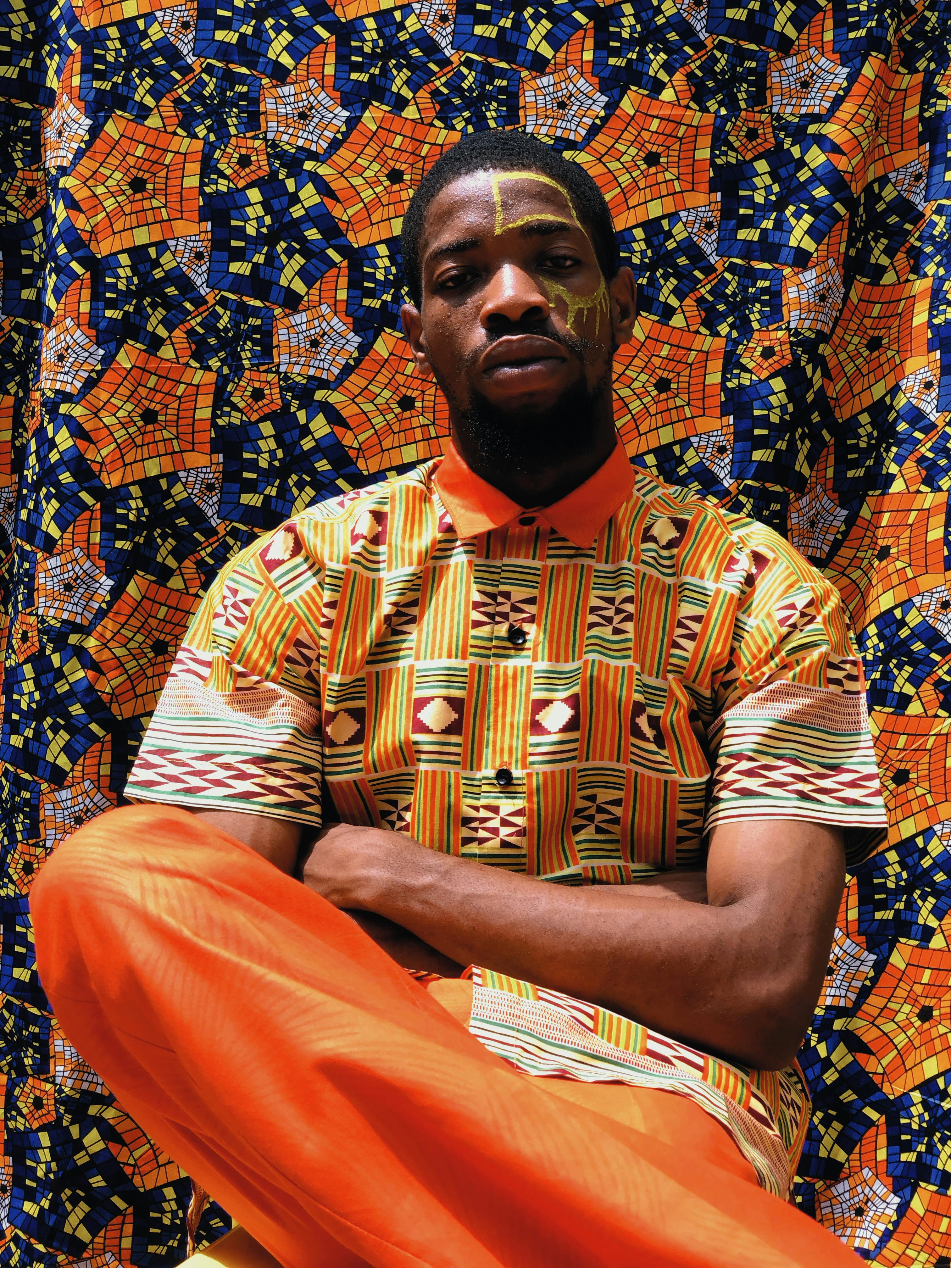 Young Man with a Face Painting Wearing Traditional Clothing · Free ...