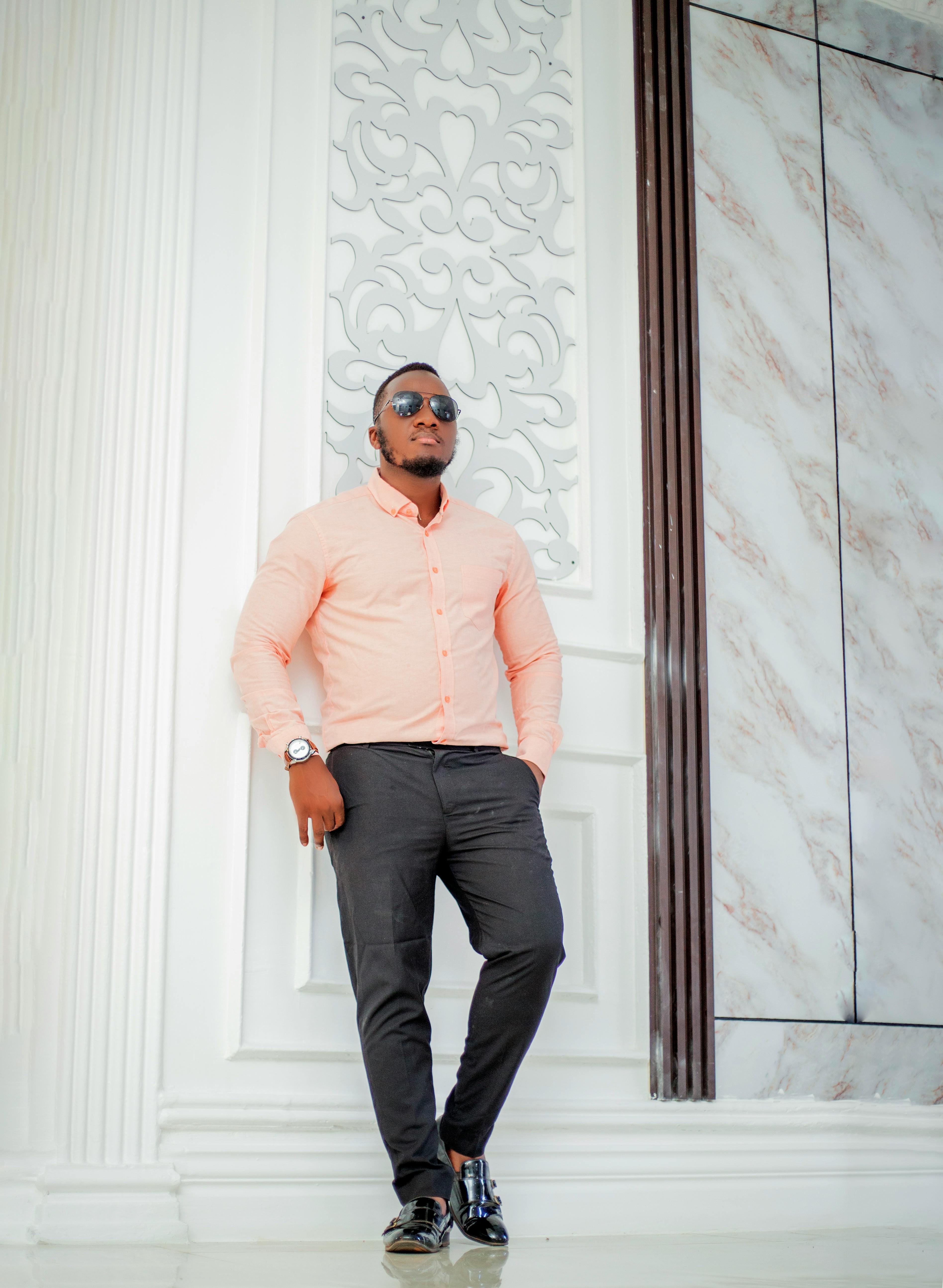 Elegant Man Standing in a Modern Interior · Free Stock Photo