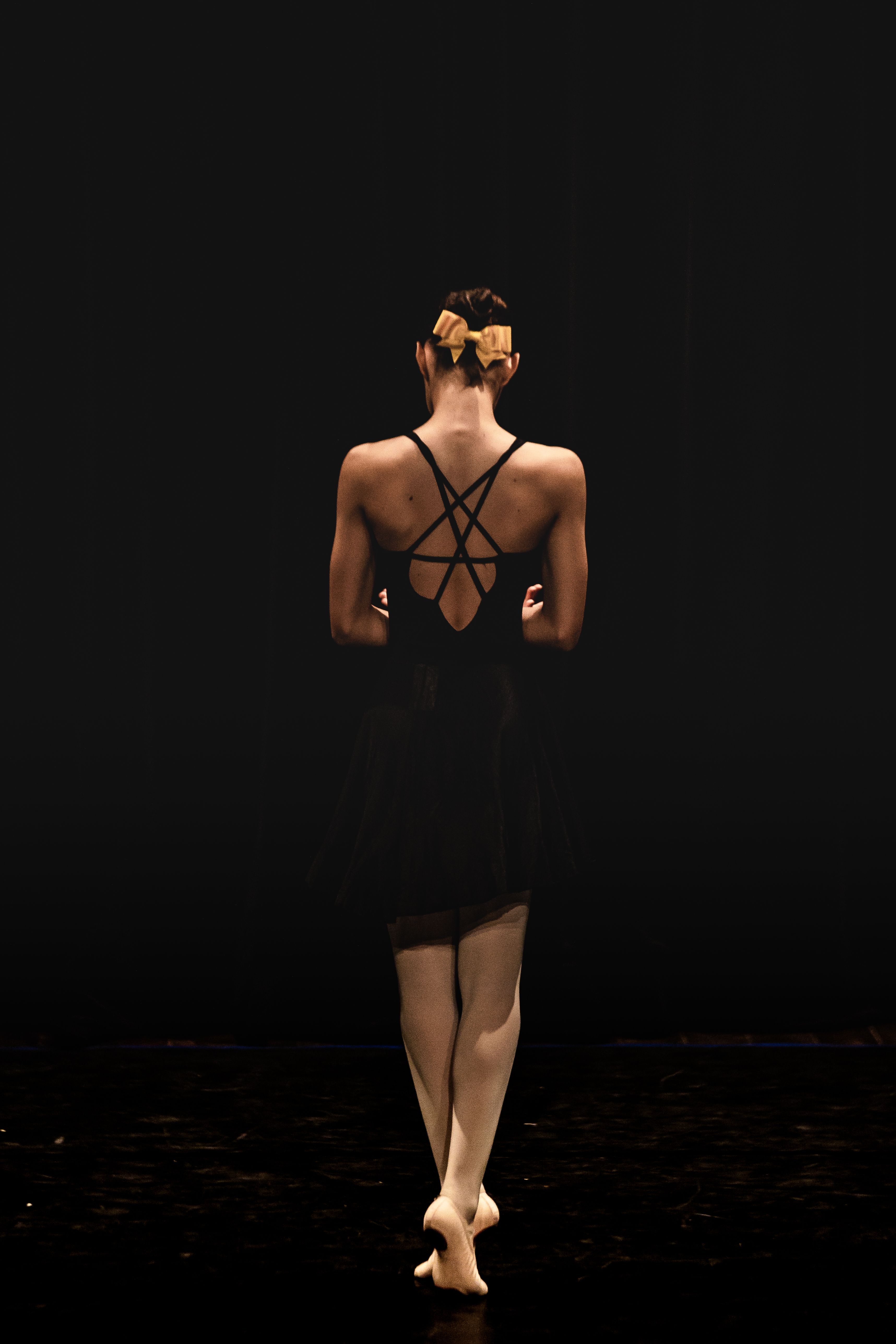 Woman Posing in Black Modest Dress · Free Stock Photo