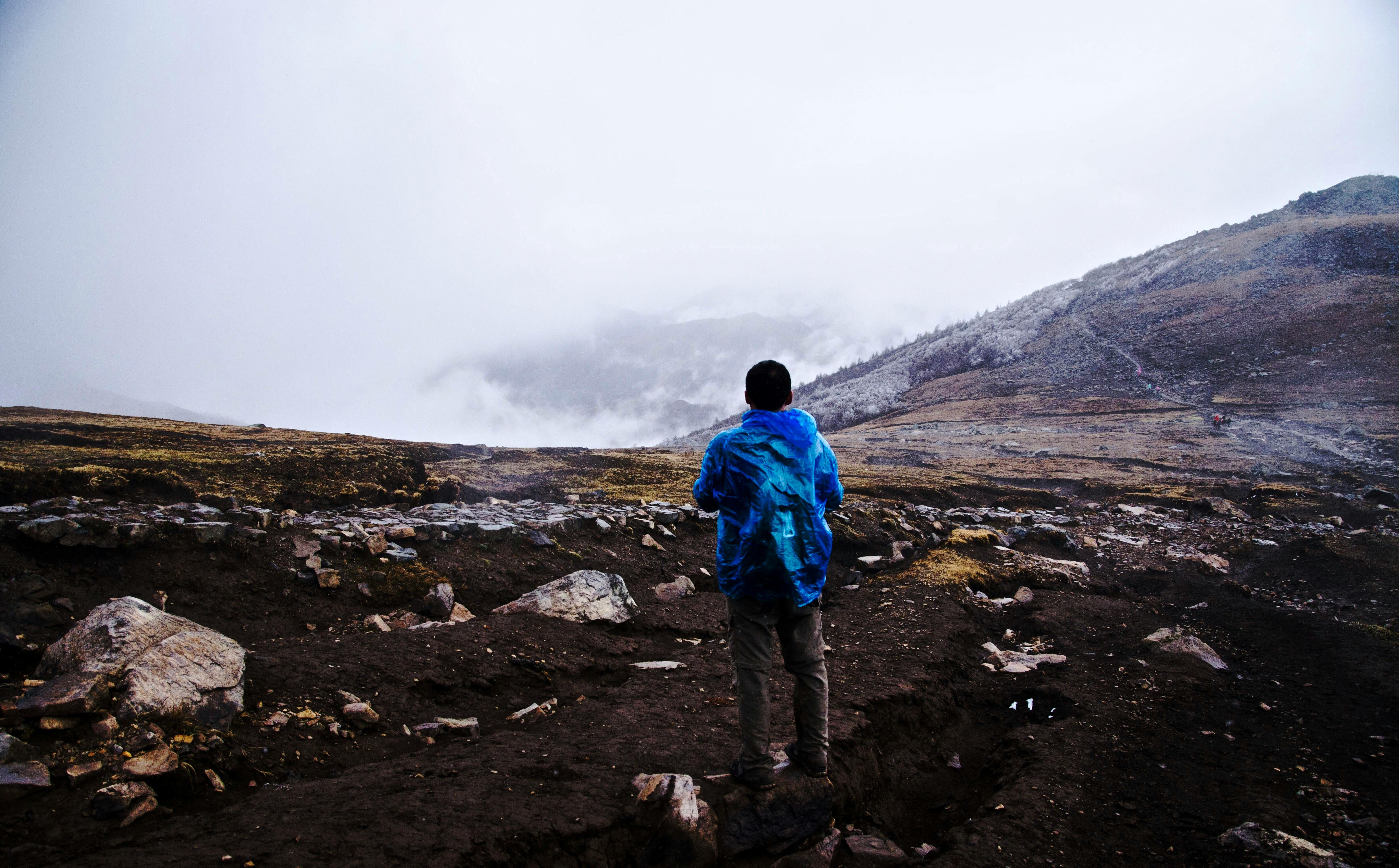 Person Overlooking White Clouds · Free Stock Photo