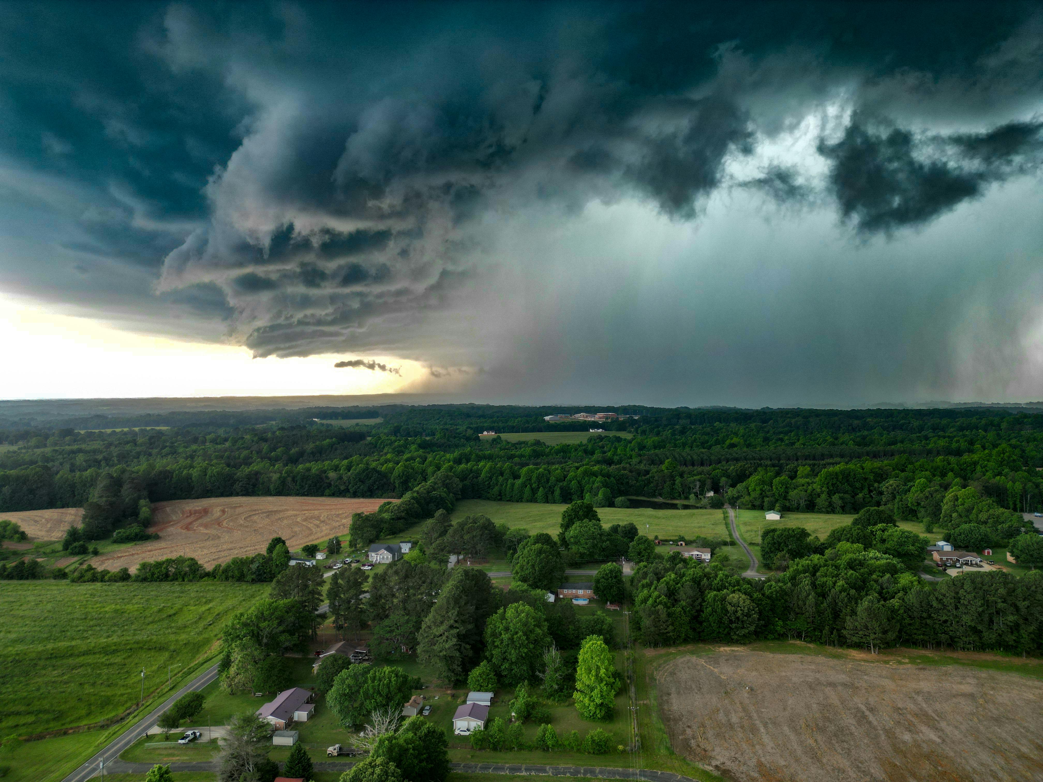Storm Clouds over a Countryside · Free Stock Photo