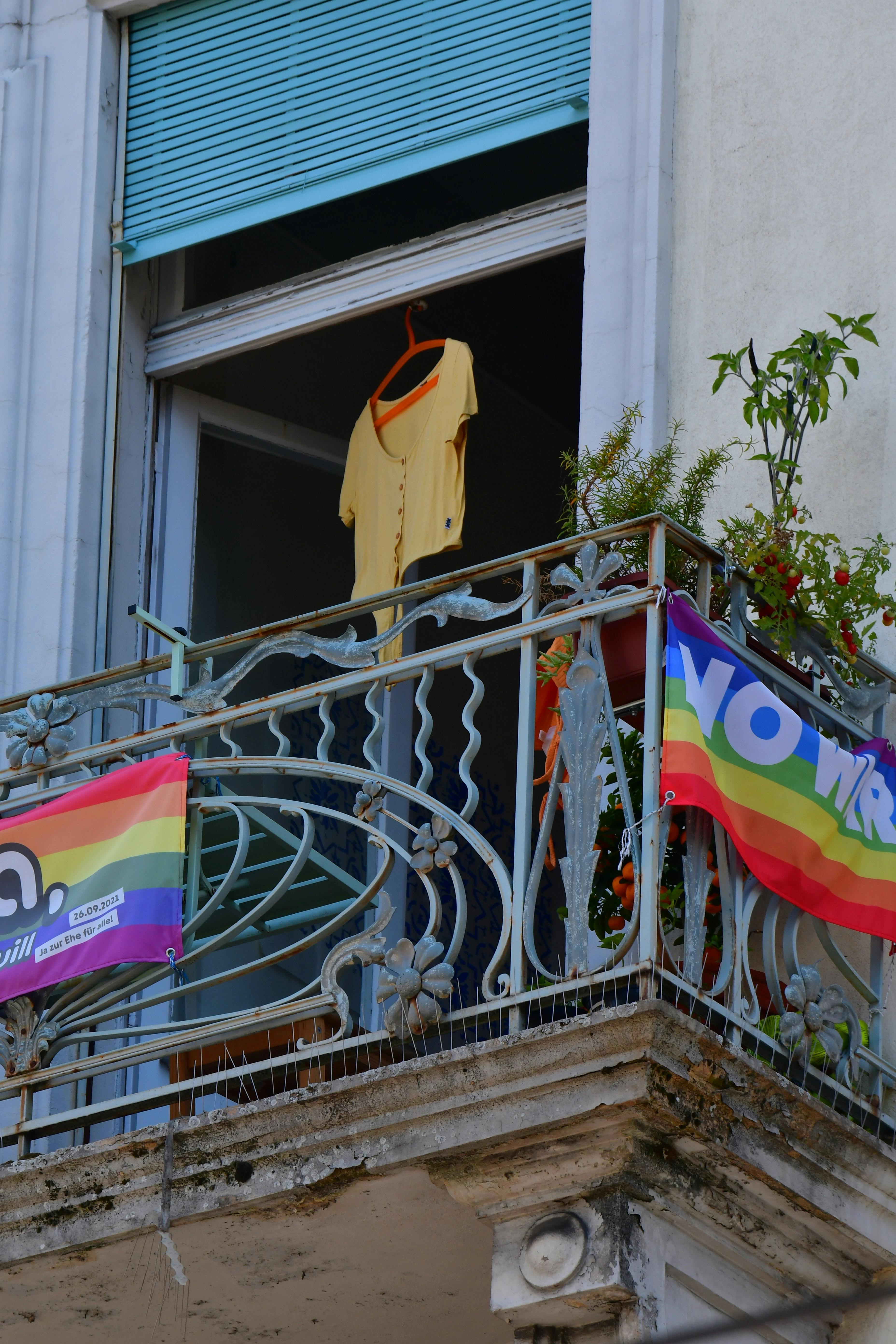 Banners on Balcony Railing · Free Stock Photo