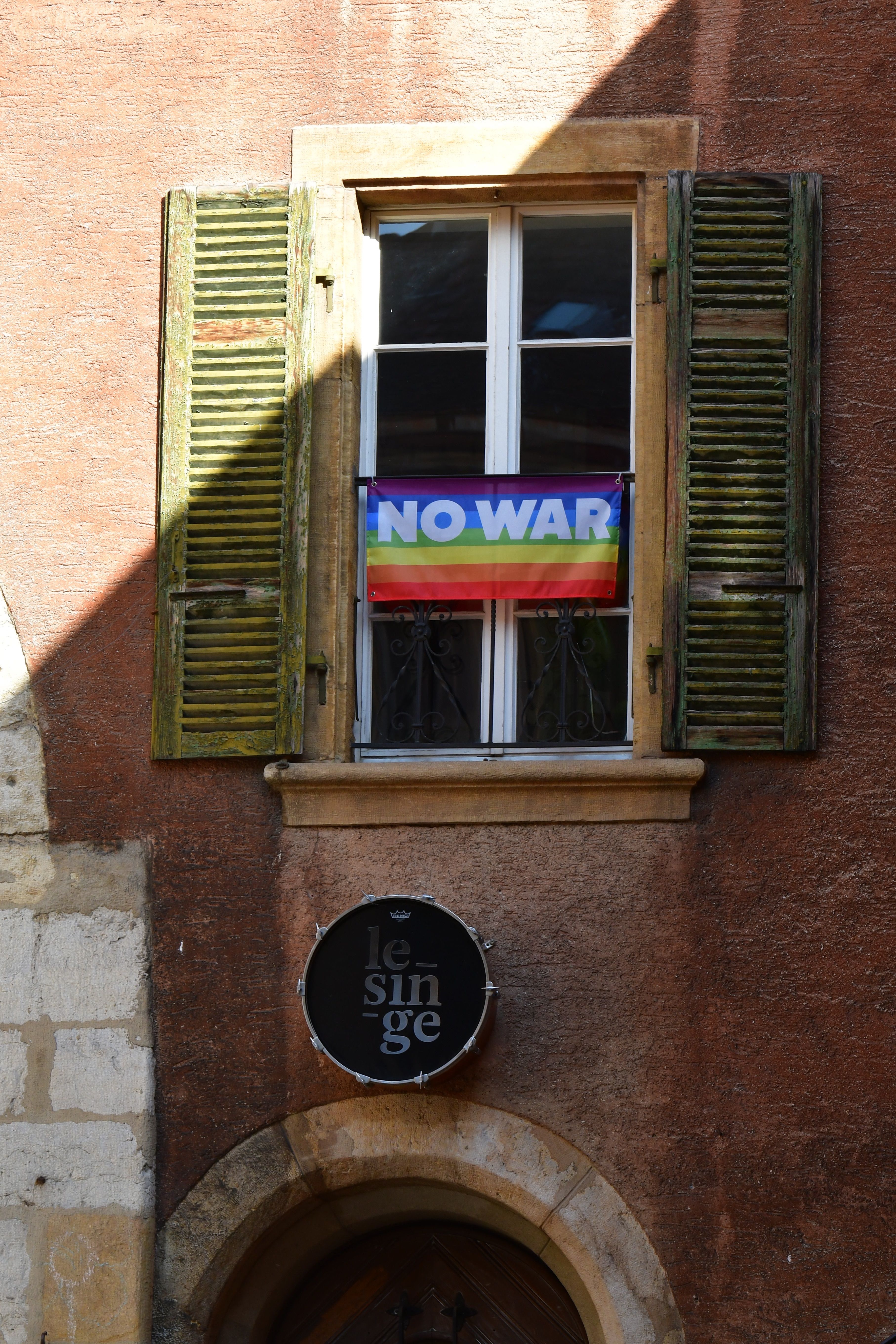 Banner on Windows in Building · Free Stock Photo