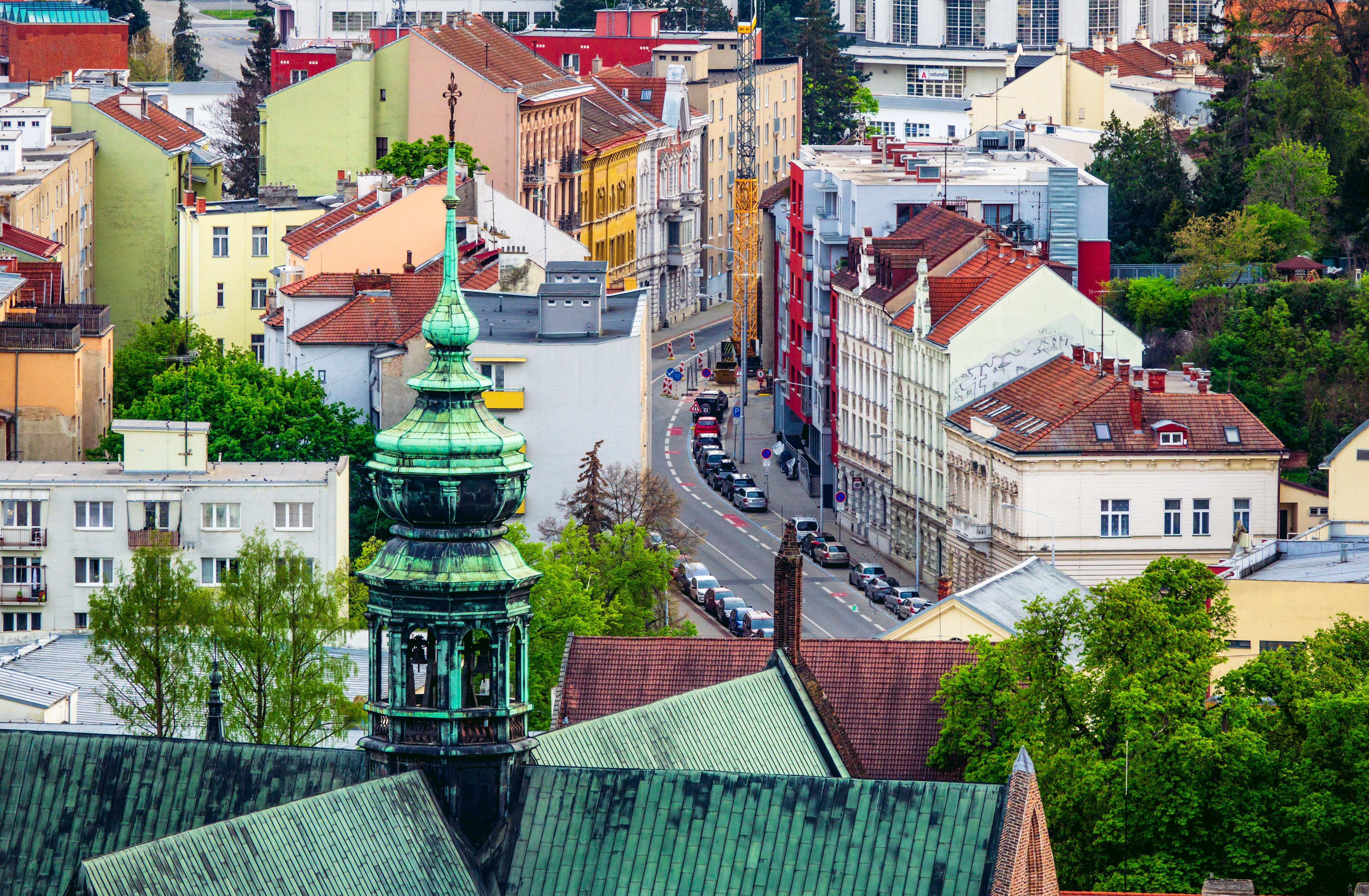 Gothic Green Tower Against Cityscape · Free Stock Photo