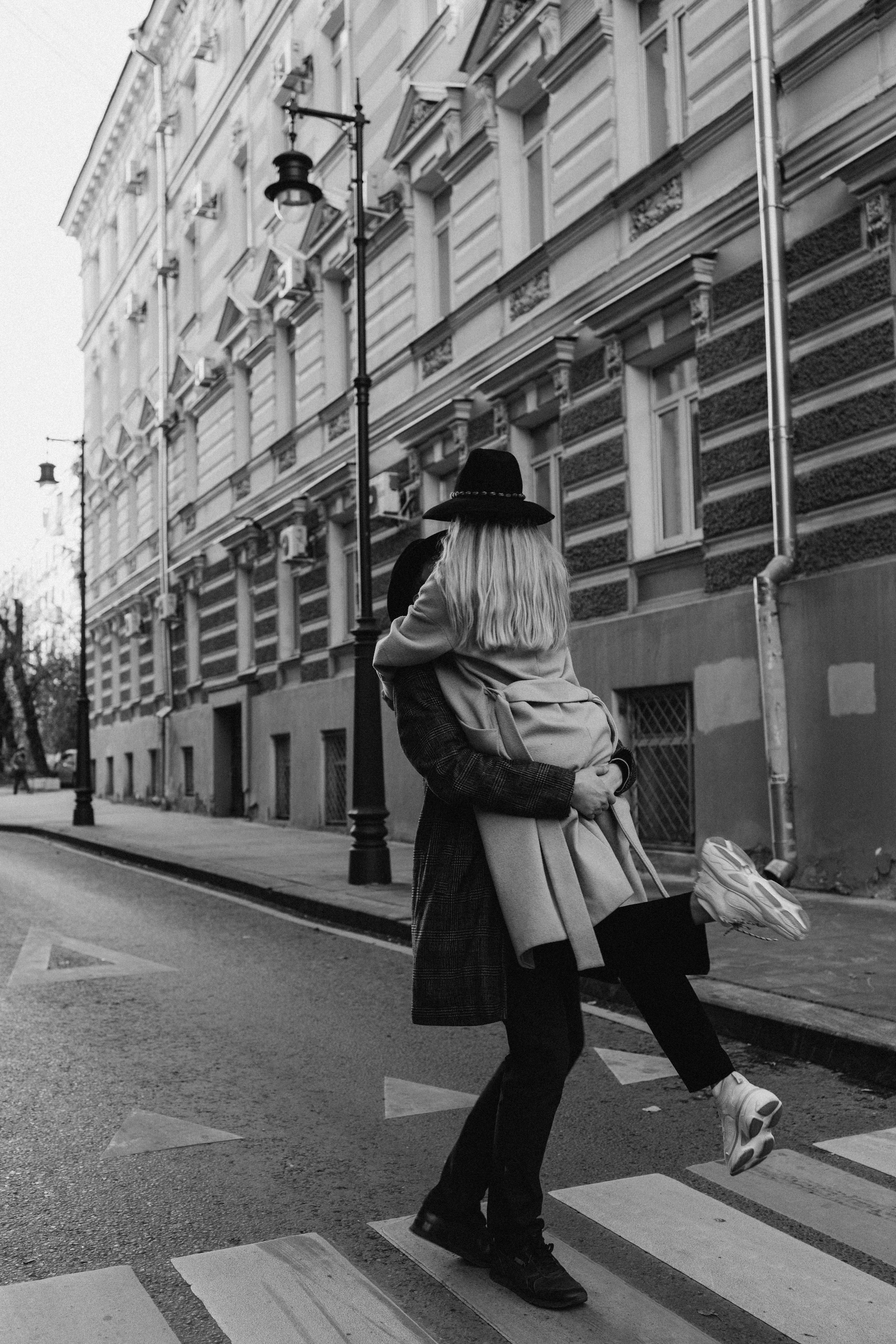 Man Picking Up His Girlfriend on the Street in City · Free Stock Photo