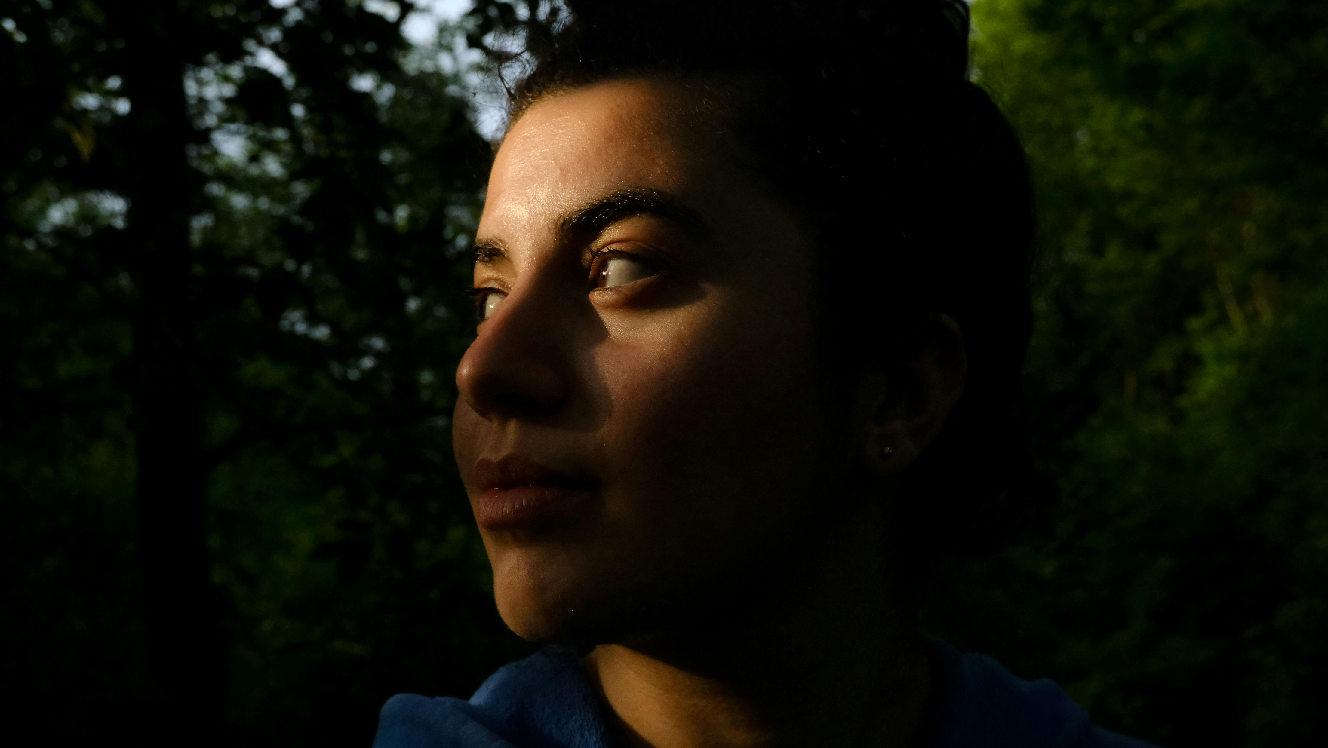 Brunette Woman Face in Shadow · Free Stock Photo