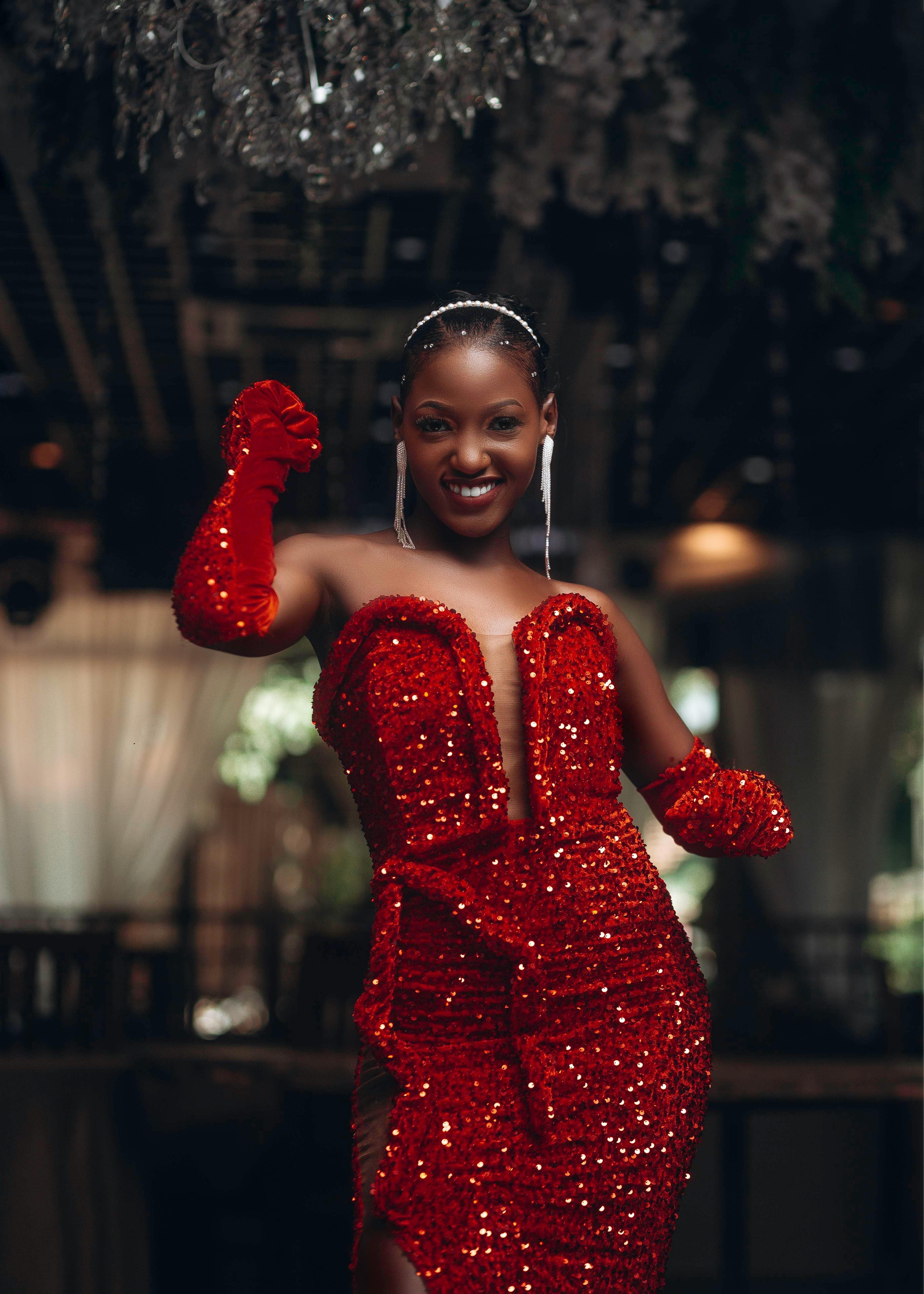 Smiling Dancer in Red Dress · Free Stock Photo