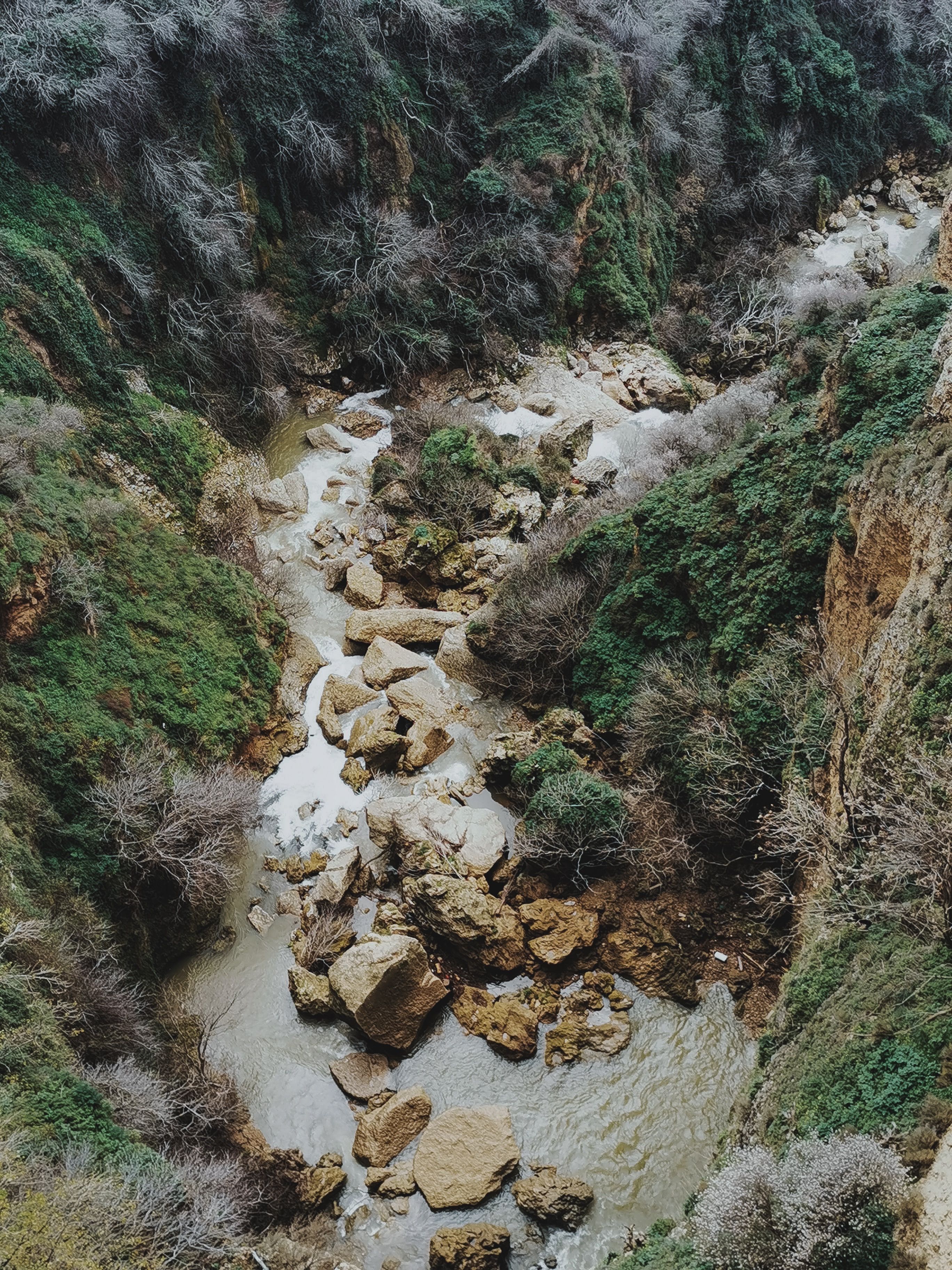 Aerial View on a Muddy River with Stones · Free Stock Photo