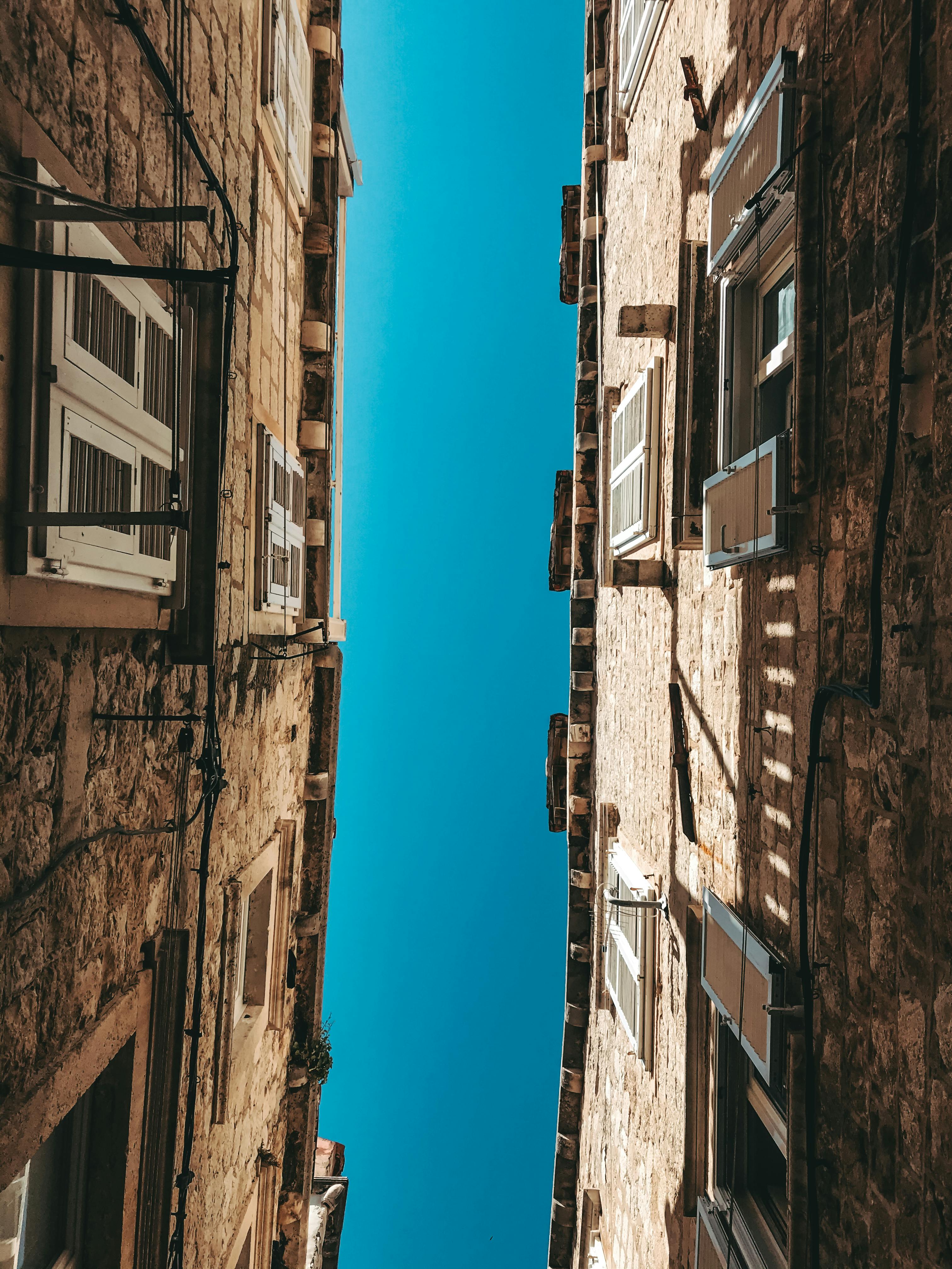 Walls of Narrow Buildings in Town · Free Stock Photo