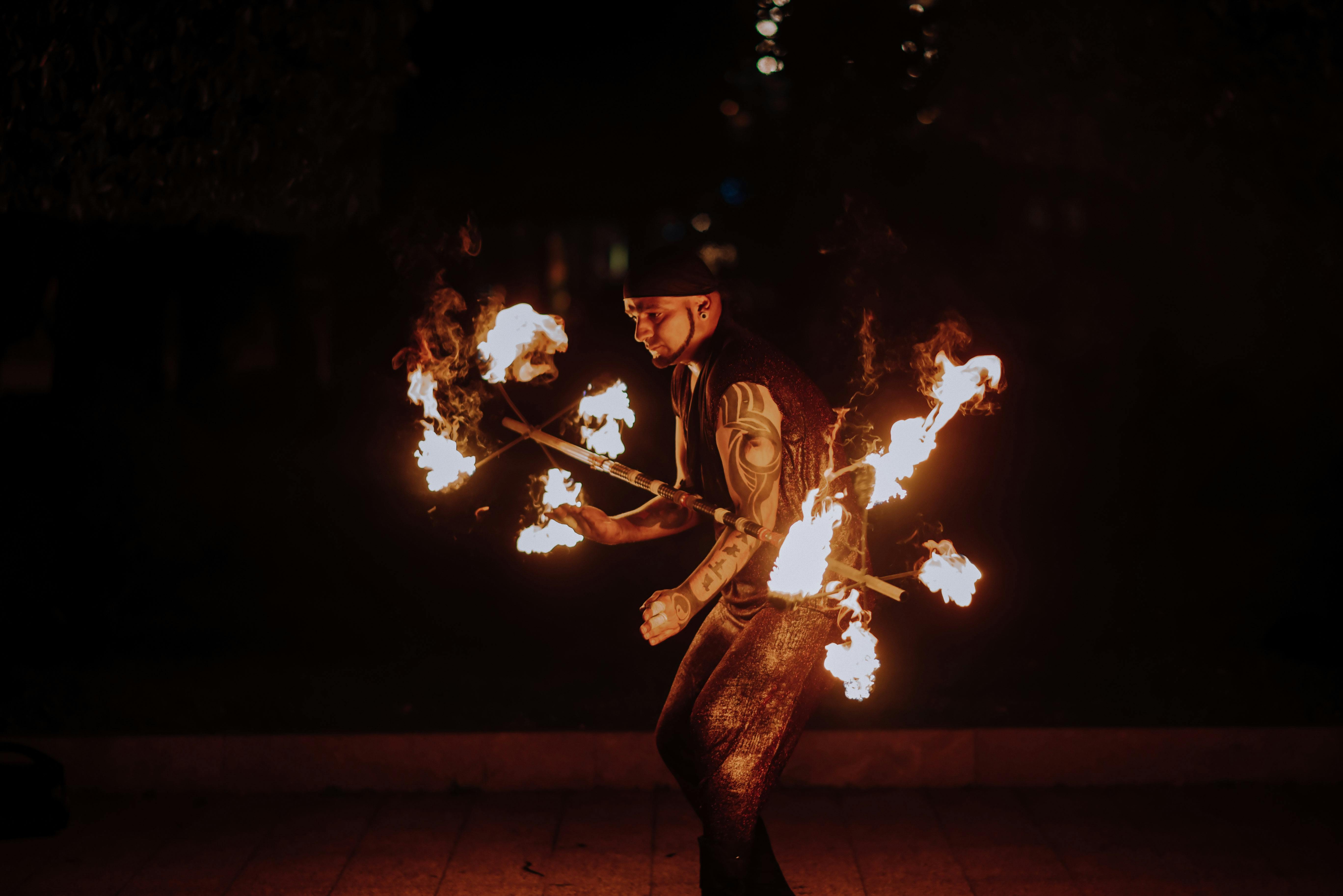 A Man in Hawaiian Traditional Fire Dance · Free Stock Photo