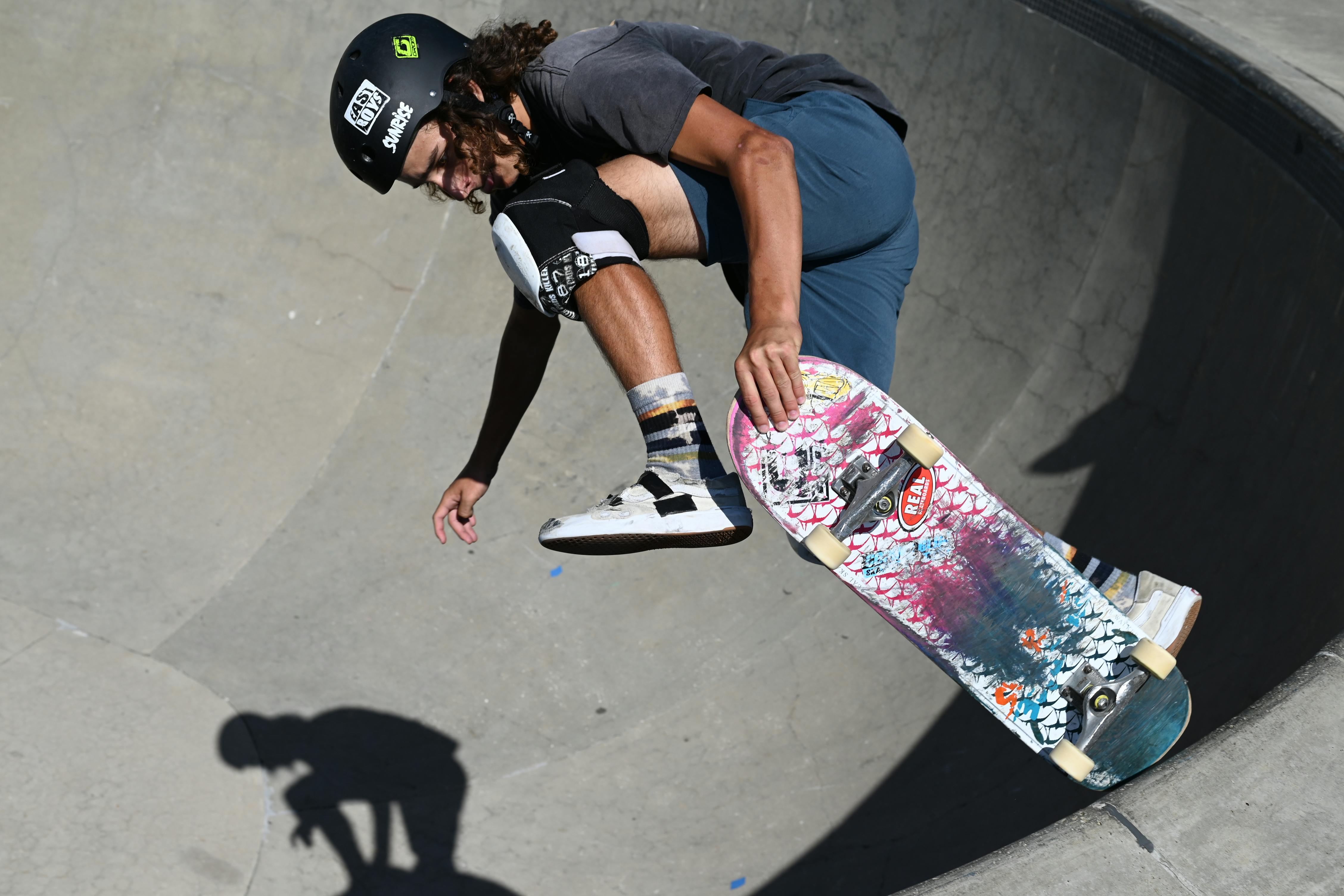 Man Sitting on Skate Park Ramp · Free Stock Photo