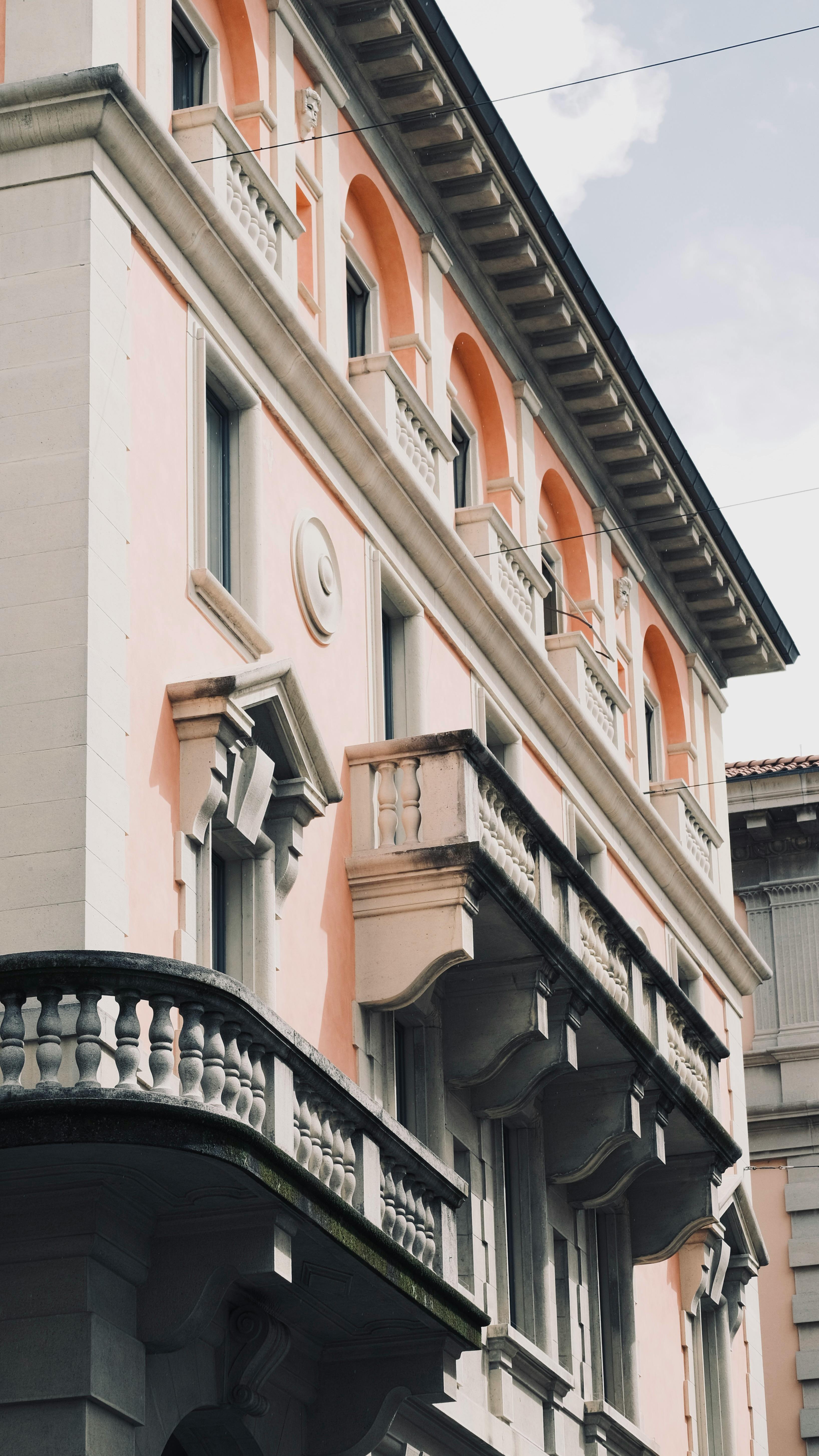 Balconies on Historic Building Facade · Free Stock Photo