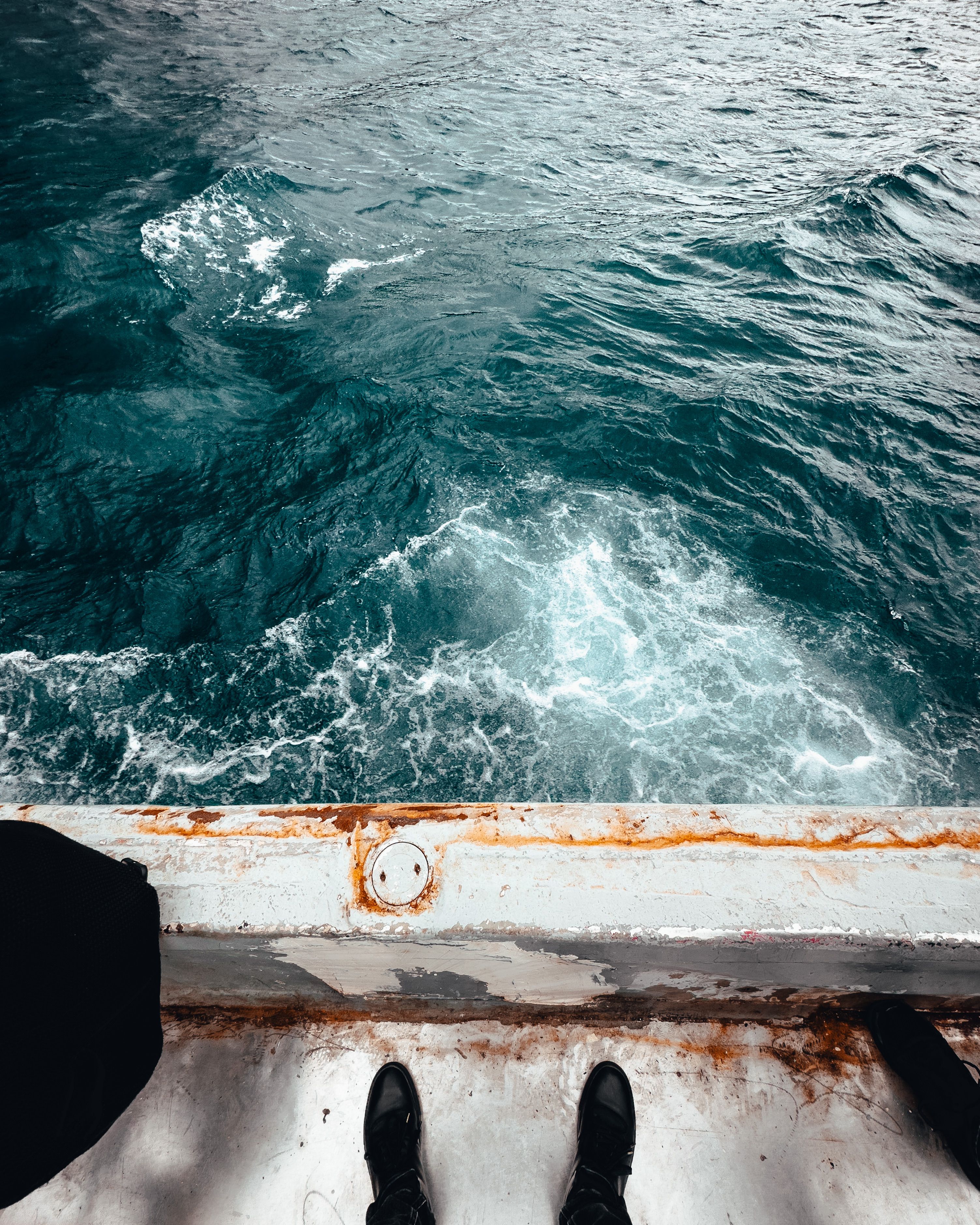 Man Legs on Ship Deck in Sea · Free Stock Photo