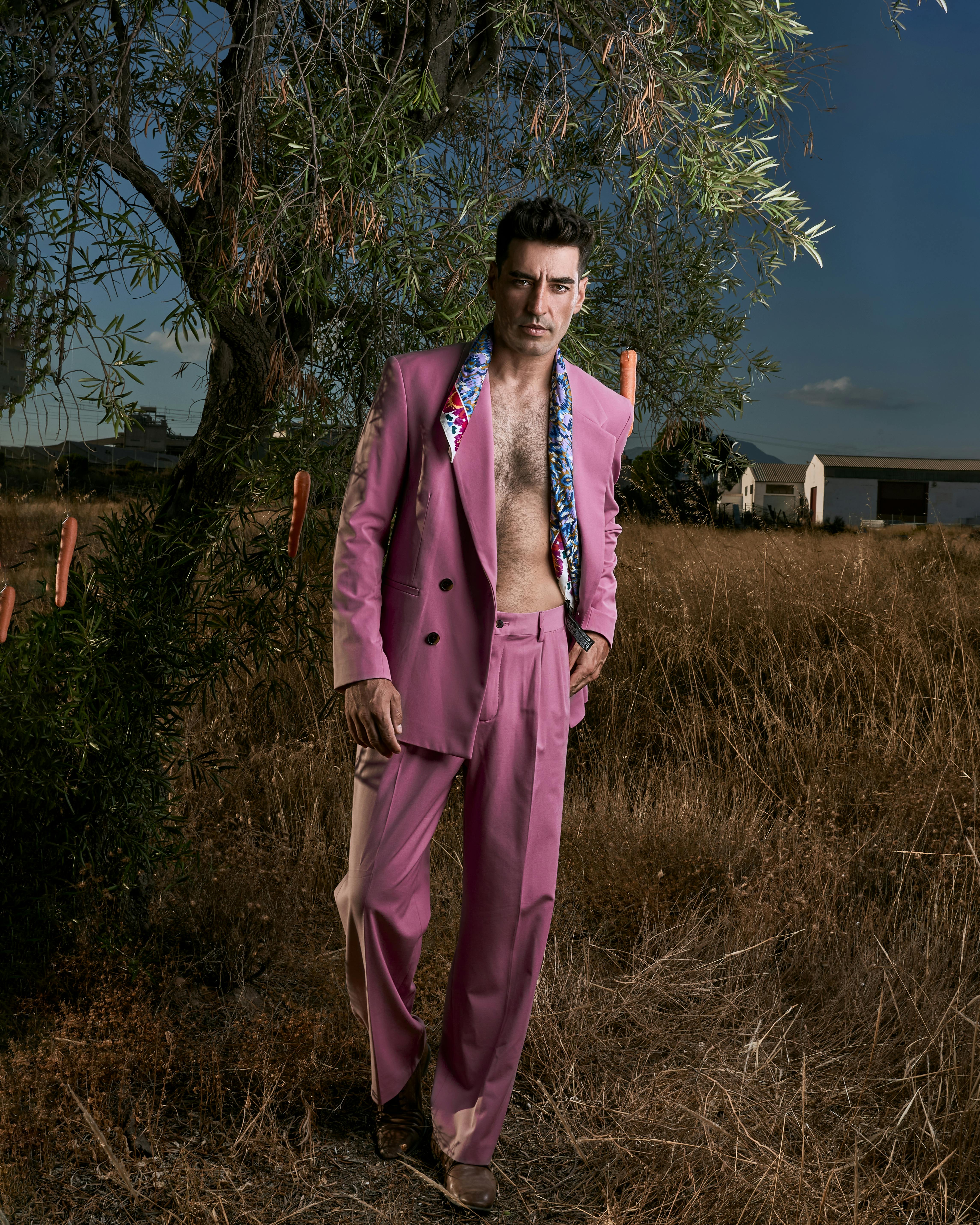 Shirtless man in Purple Suit by Tree · Free Stock Photo
