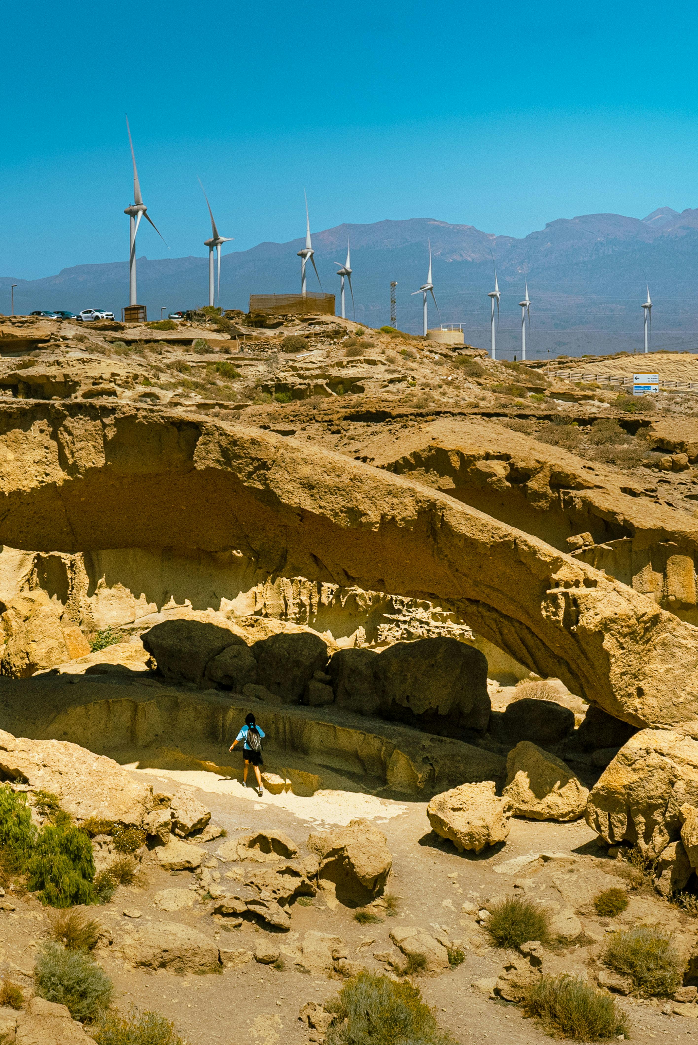 Wind Turbines over Rocks · Free Stock Photo