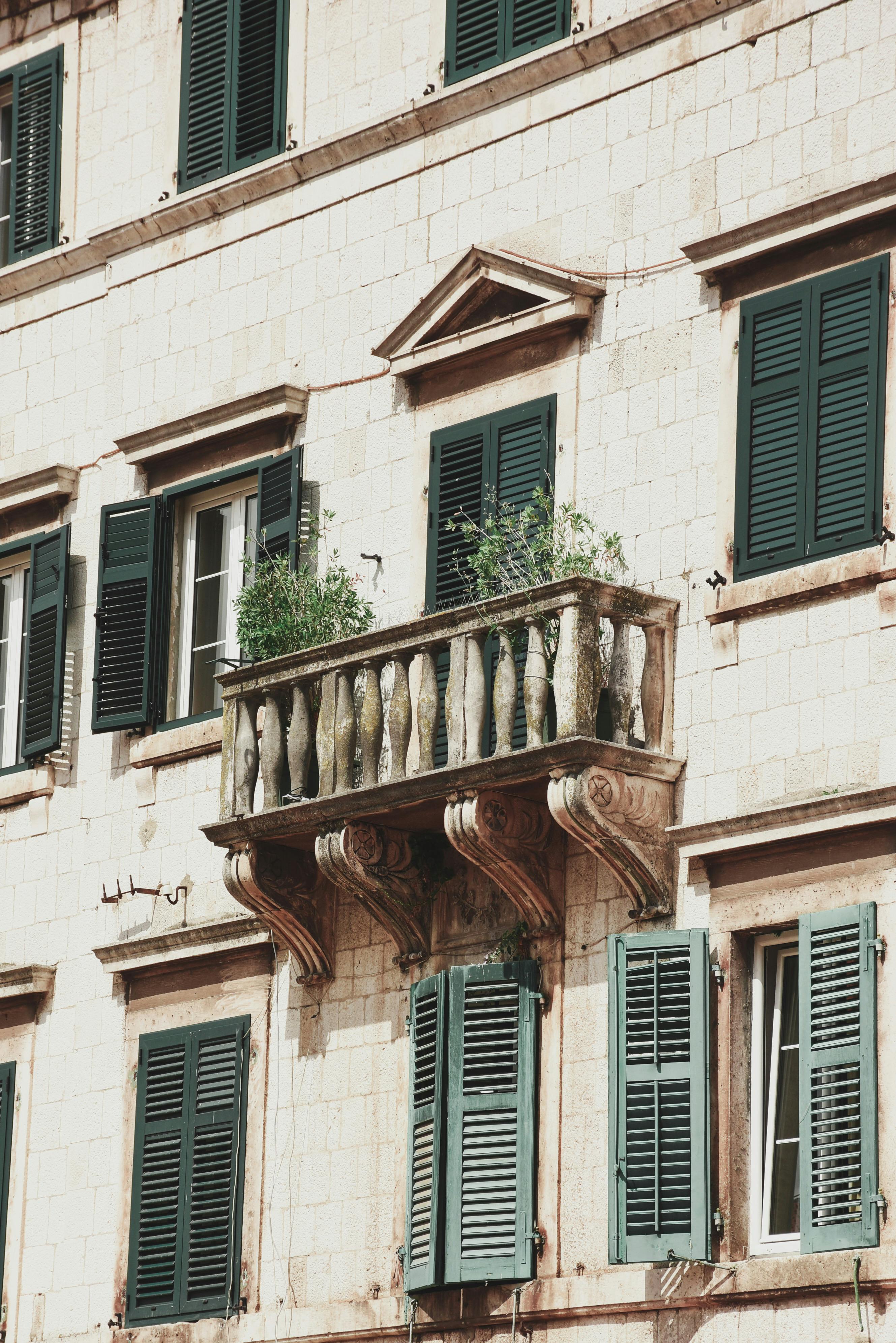 Balcony in old building with plants · Free Stock Photo