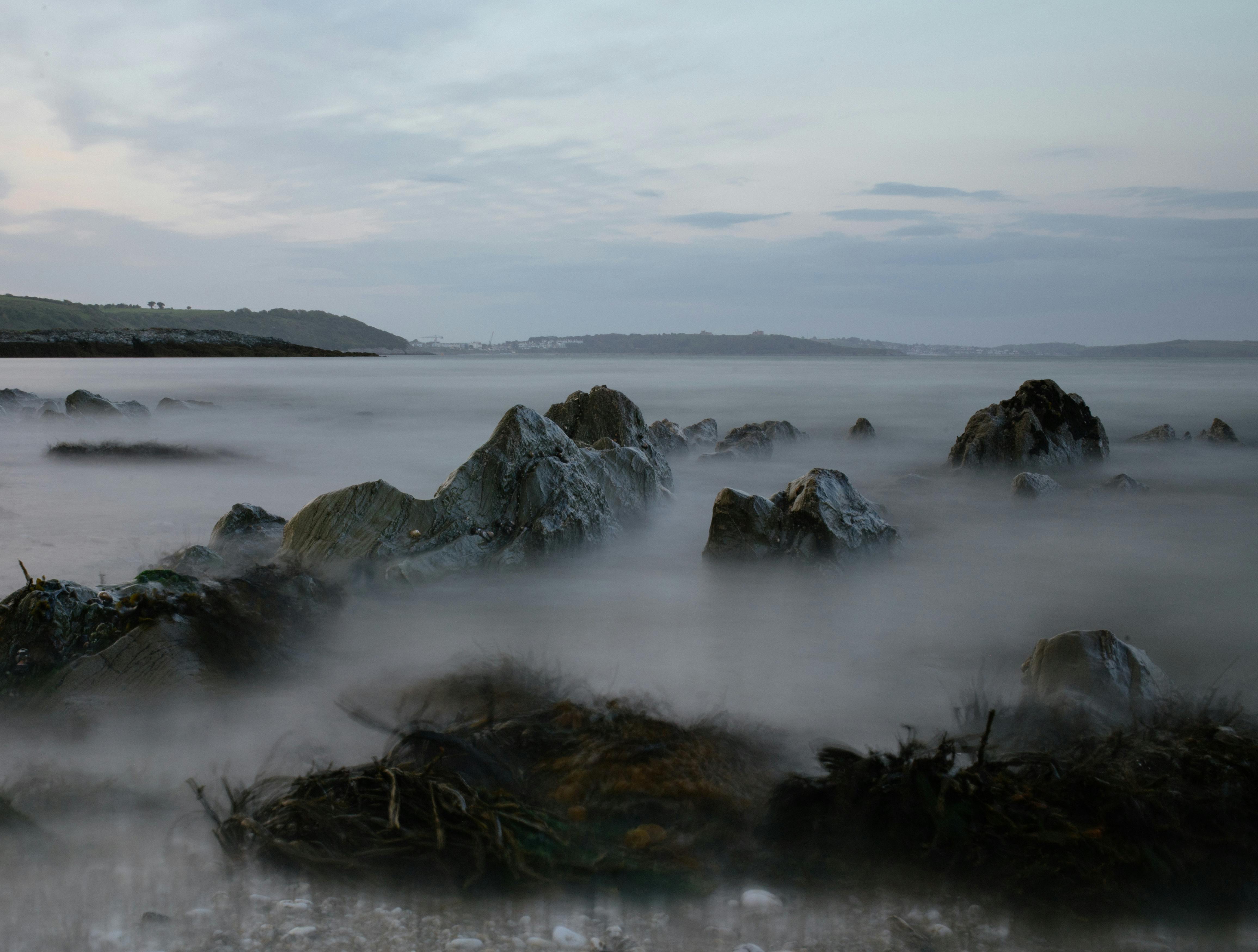 Rocks Immersed in Mist · Free Stock Photo