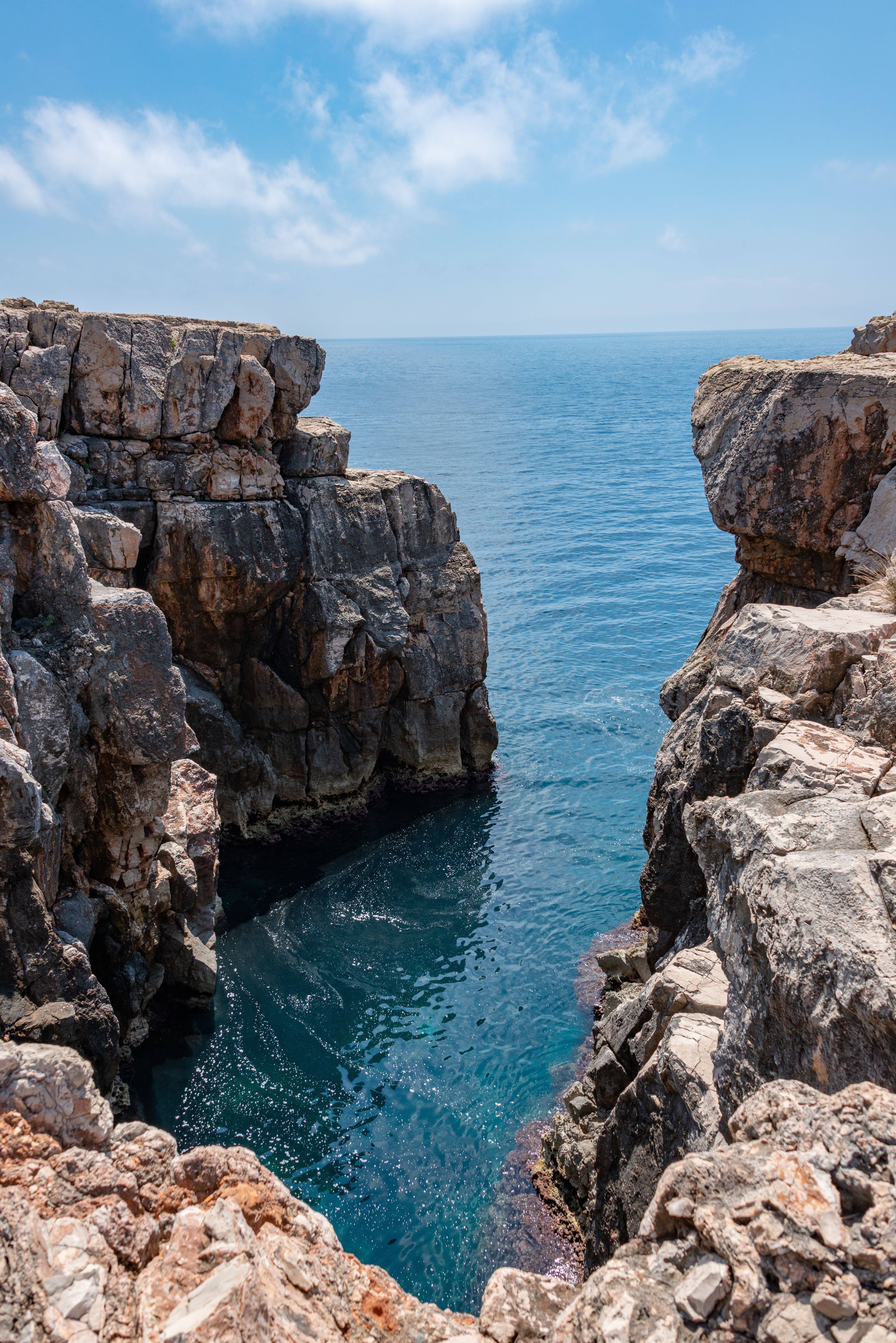 A Rocky Cliff by the Sea · Free Stock Photo
