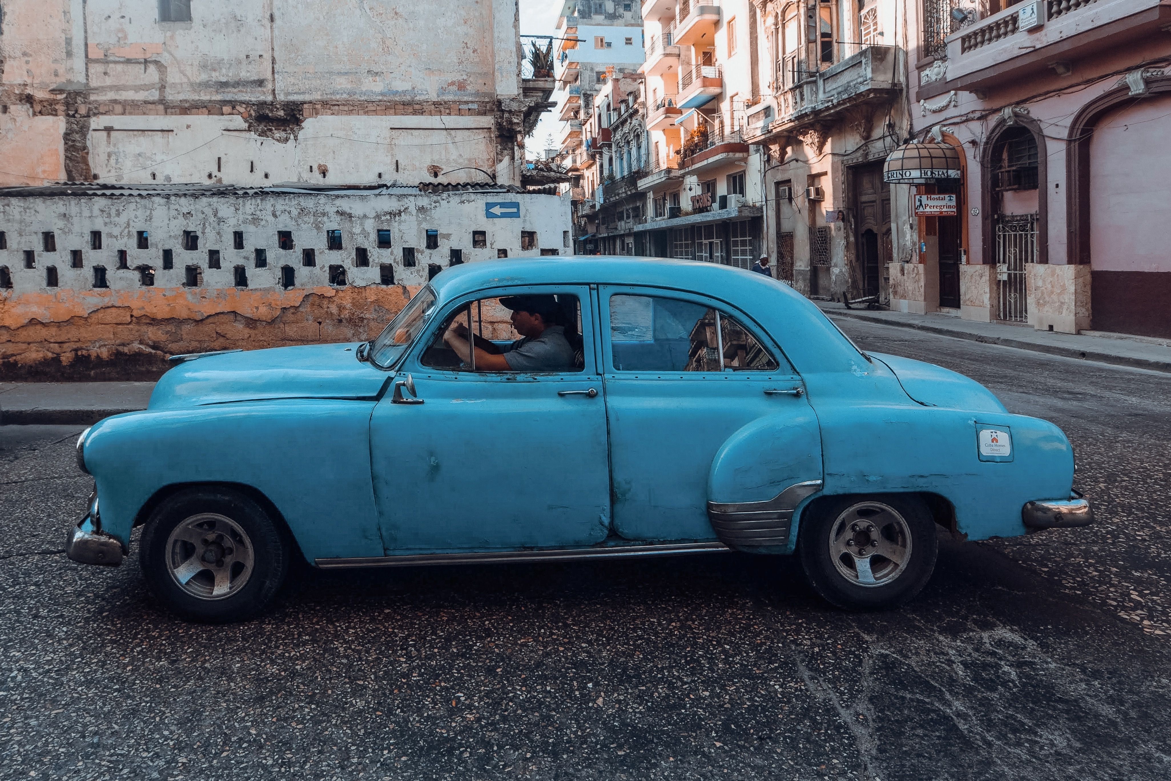 White 1952 Chevrolet Deluxe Driving Through the Streets of Havana ...