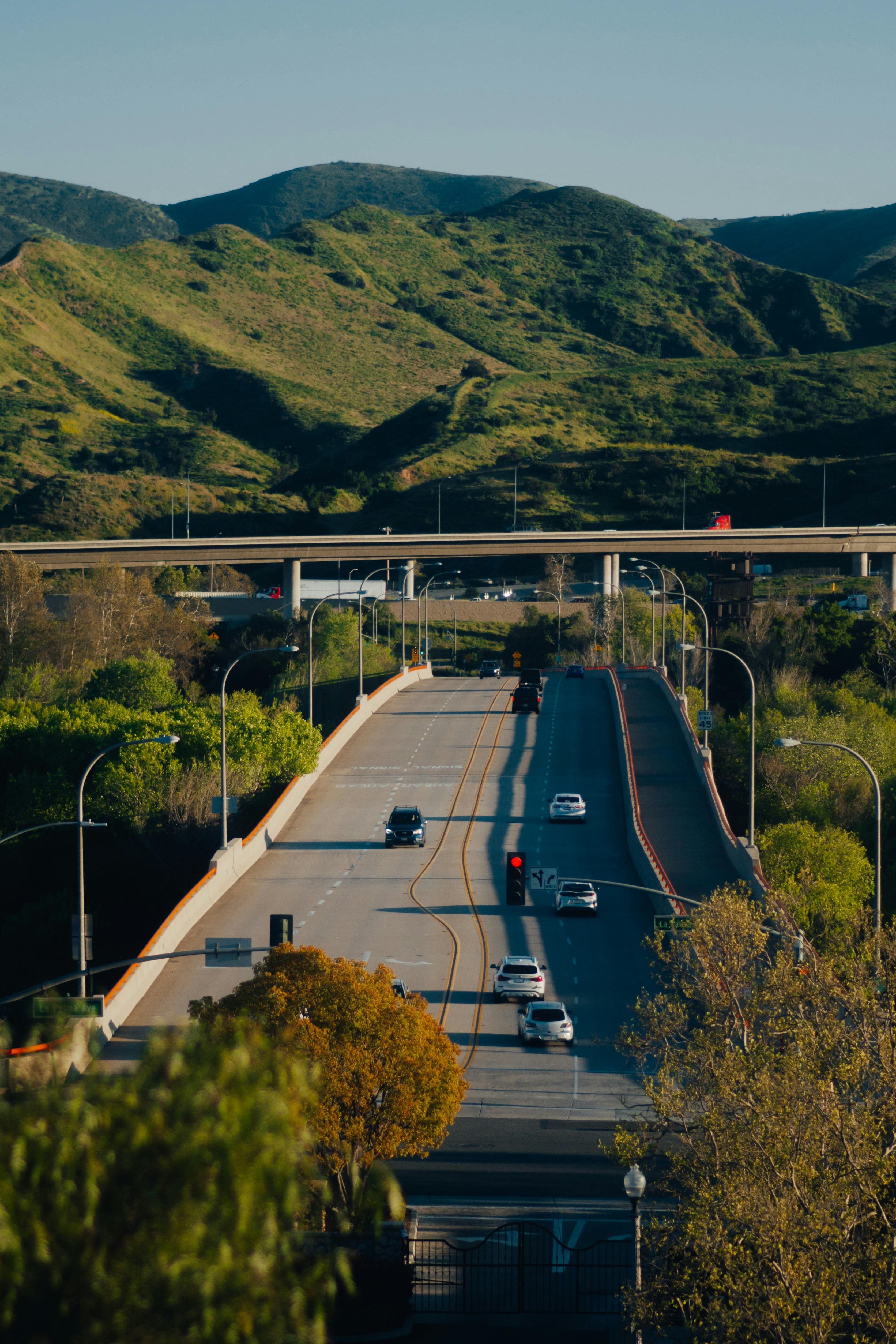 Landscape with Cars on a Highway · Free Stock Photo
