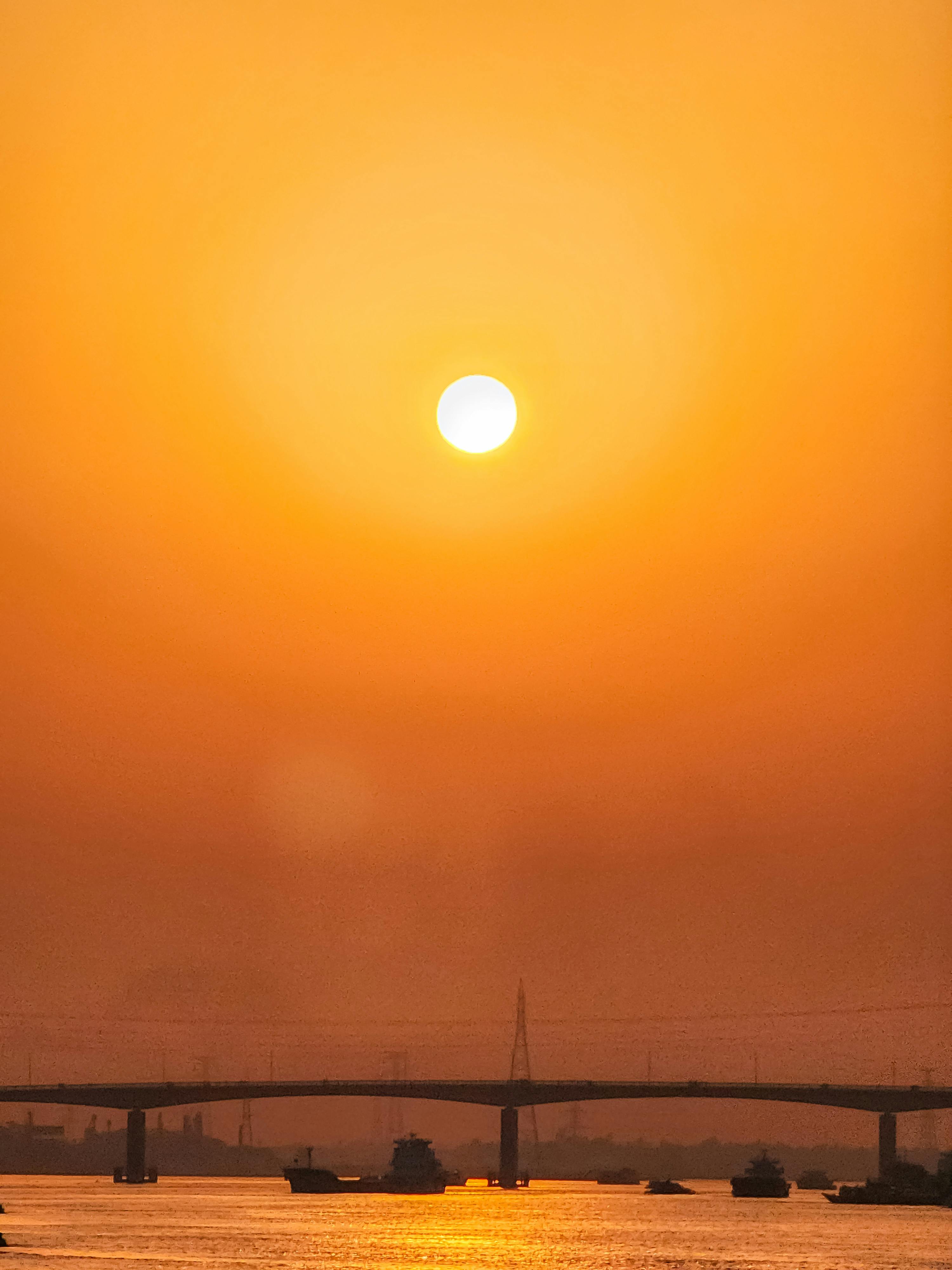 Sun over Field at Sunset · Free Stock Photo