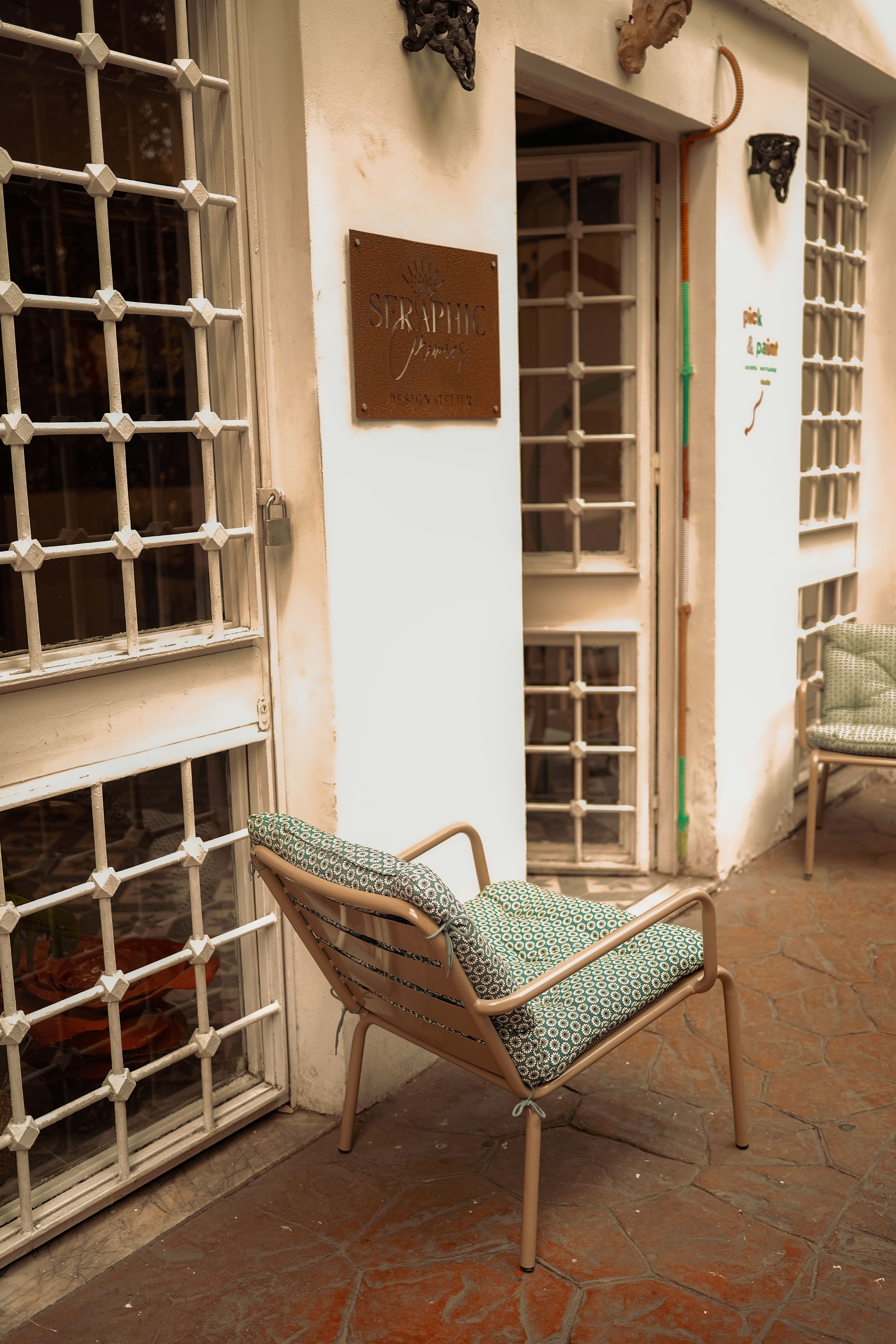 Chairs in Front of a Building Facade · Free Stock Photo