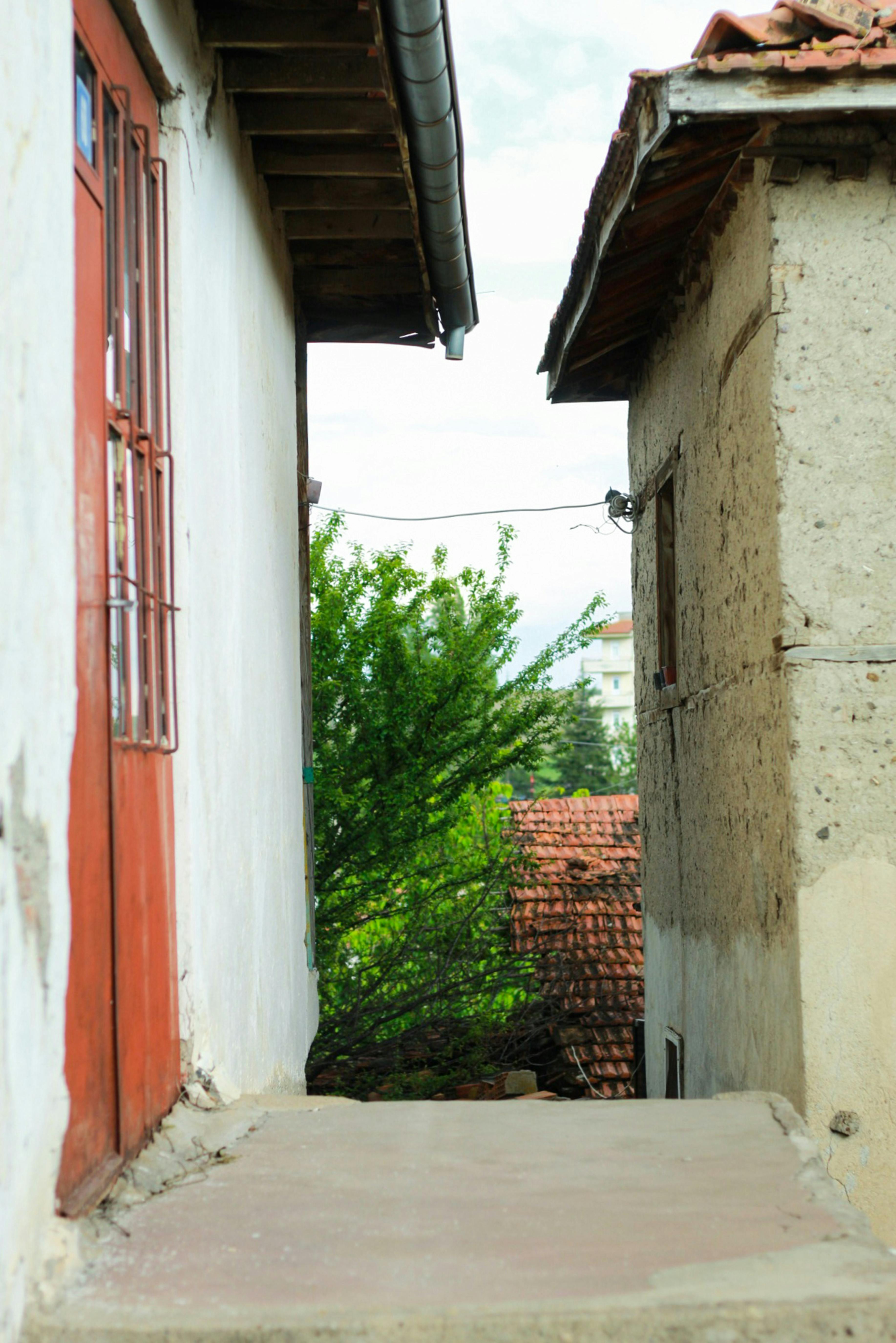 Passage between Two Buildings · Free Stock Photo
