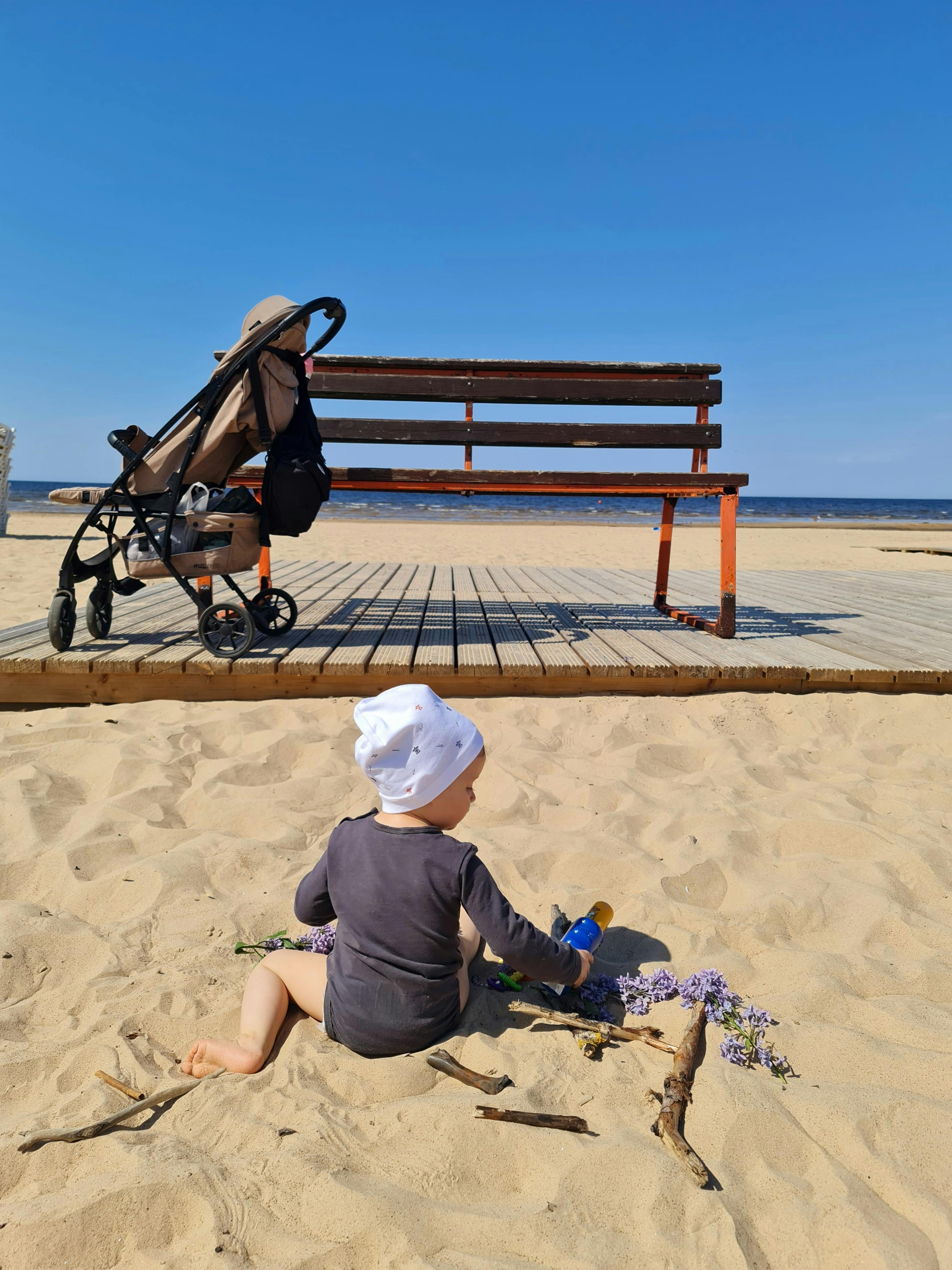 Baby Playing On Beach Free Stock Photo