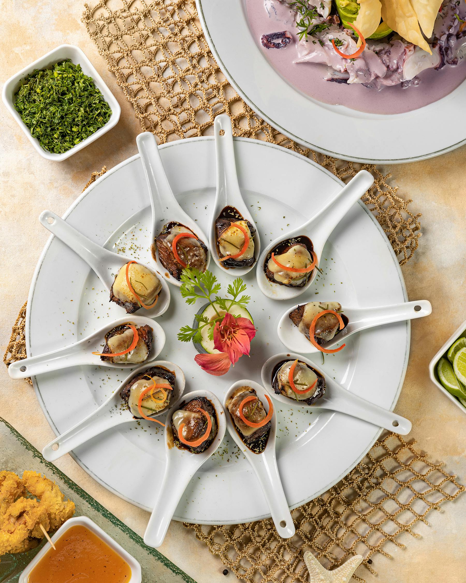 Spoons with Snacks on Plate in Restaurant · Free Stock Photo