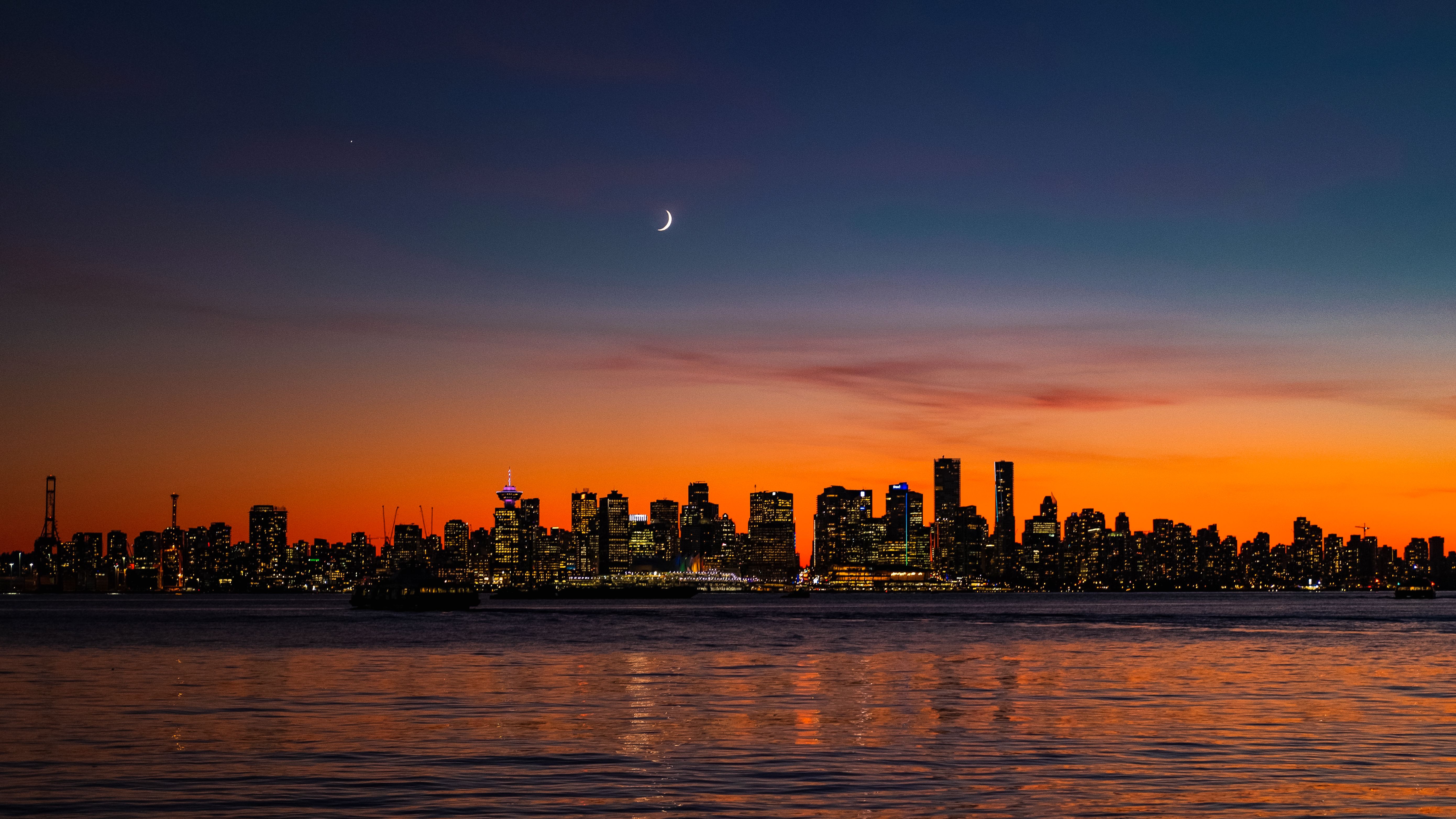 City on Sea Coast at Sunset · Free Stock Photo