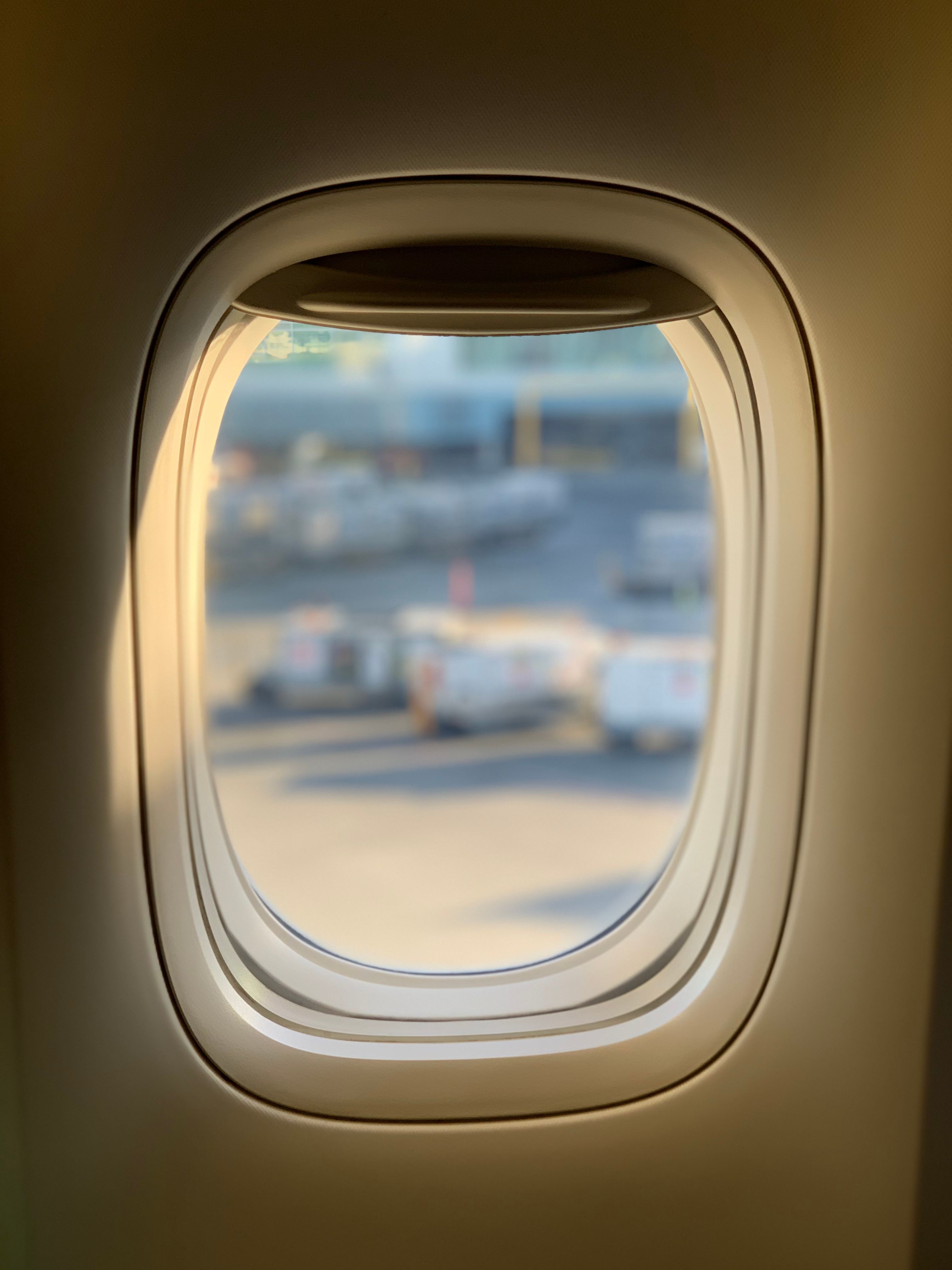 Body Of Water View From Airplane Window Free Stock Photo