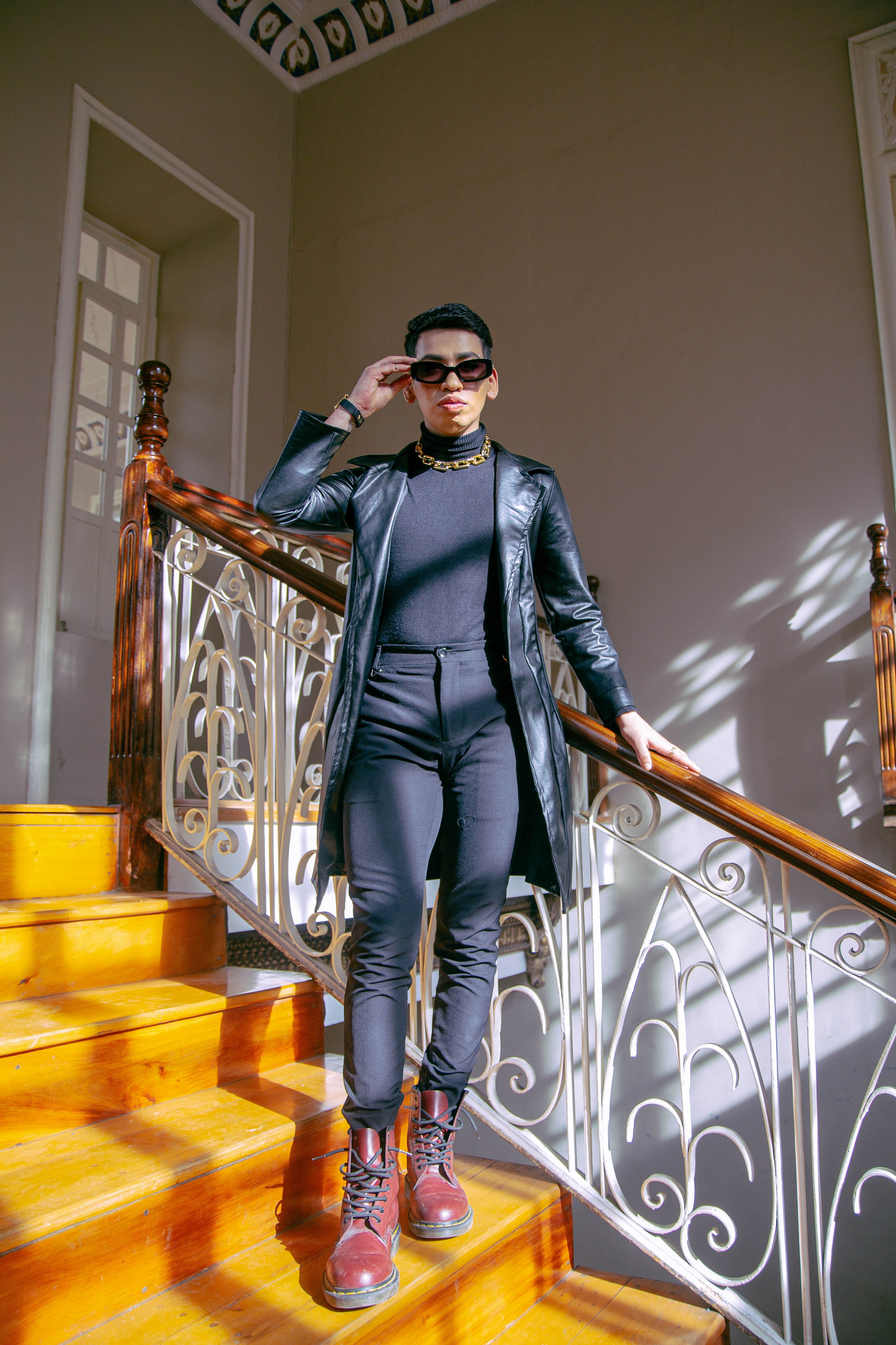 Woman with Short Hair Posing on Stairs · Free Stock Photo