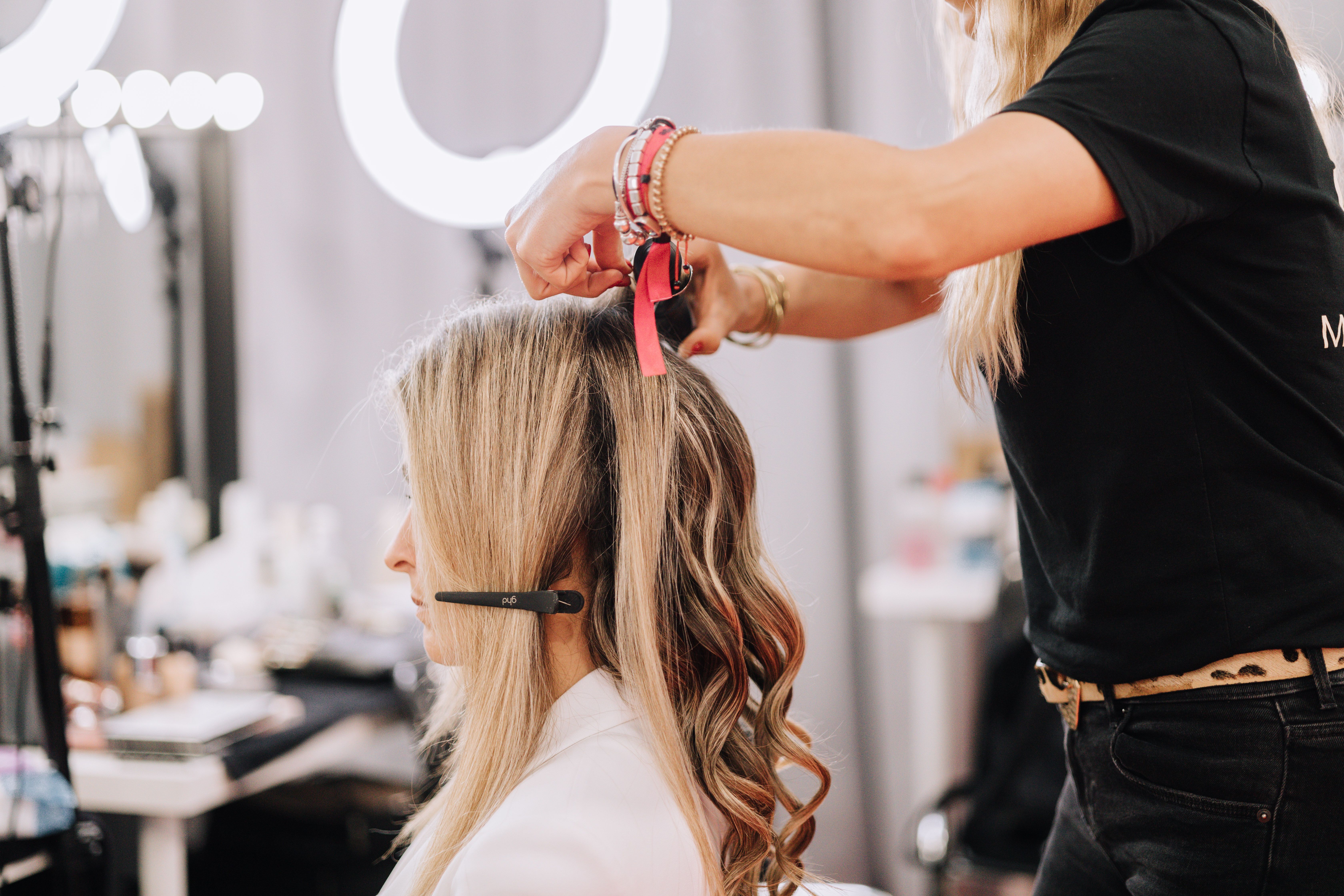 Woman Doing Her Hair on a Backstage · Free Stock Photo