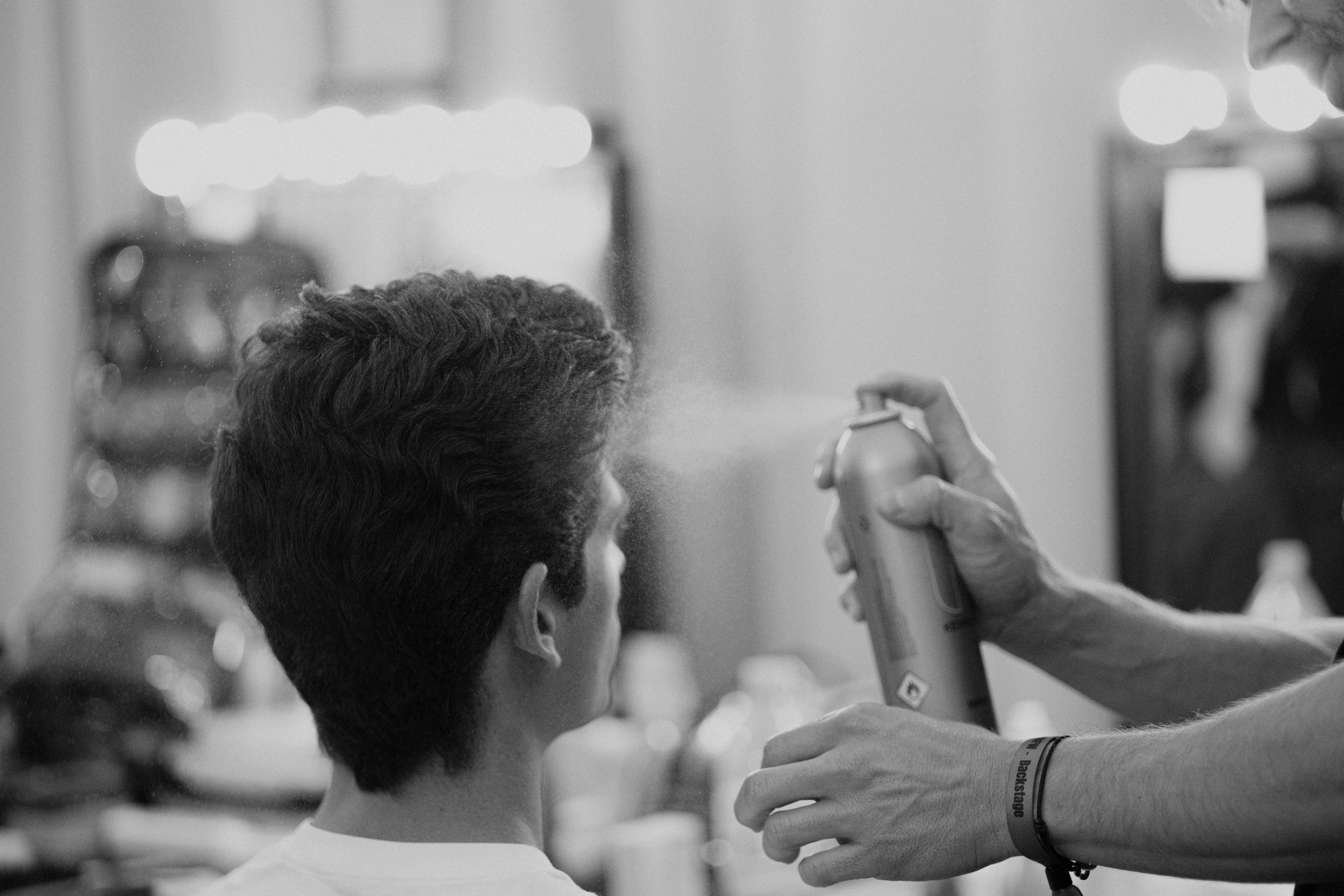 Hands Spraying Man Hair at Hairdresser · Free Stock Photo