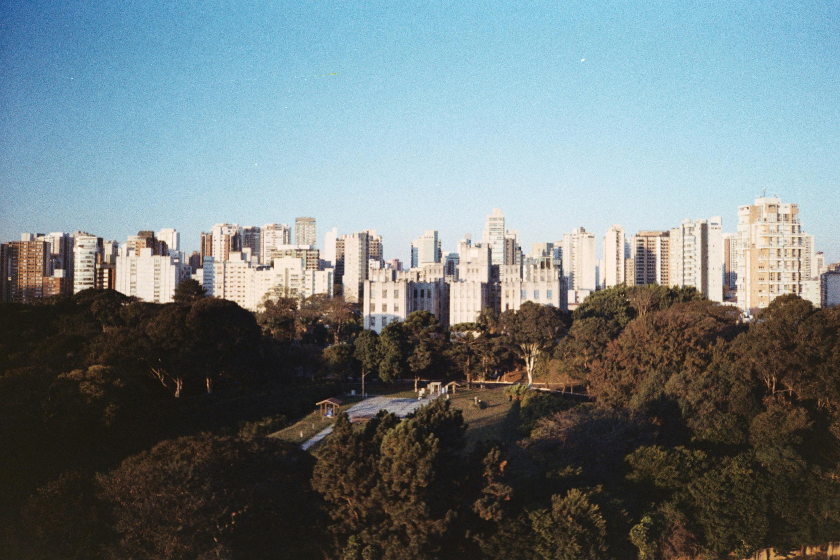 Urban Skyline with Modern Skyscrapers under Blue Sky · Free Stock Photo