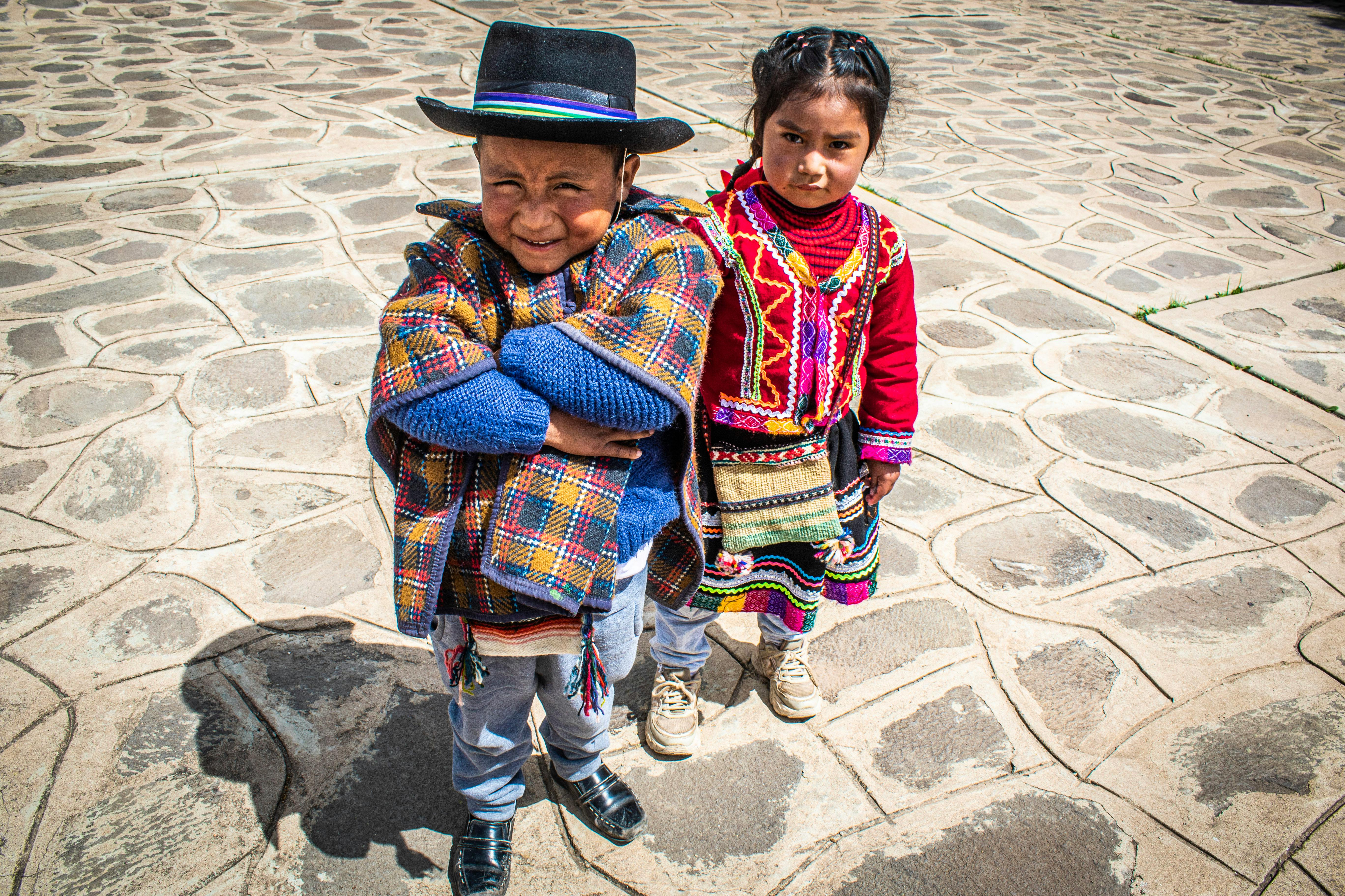 Boy and Girl Posing in Traditional Clothing · Free Stock Photo