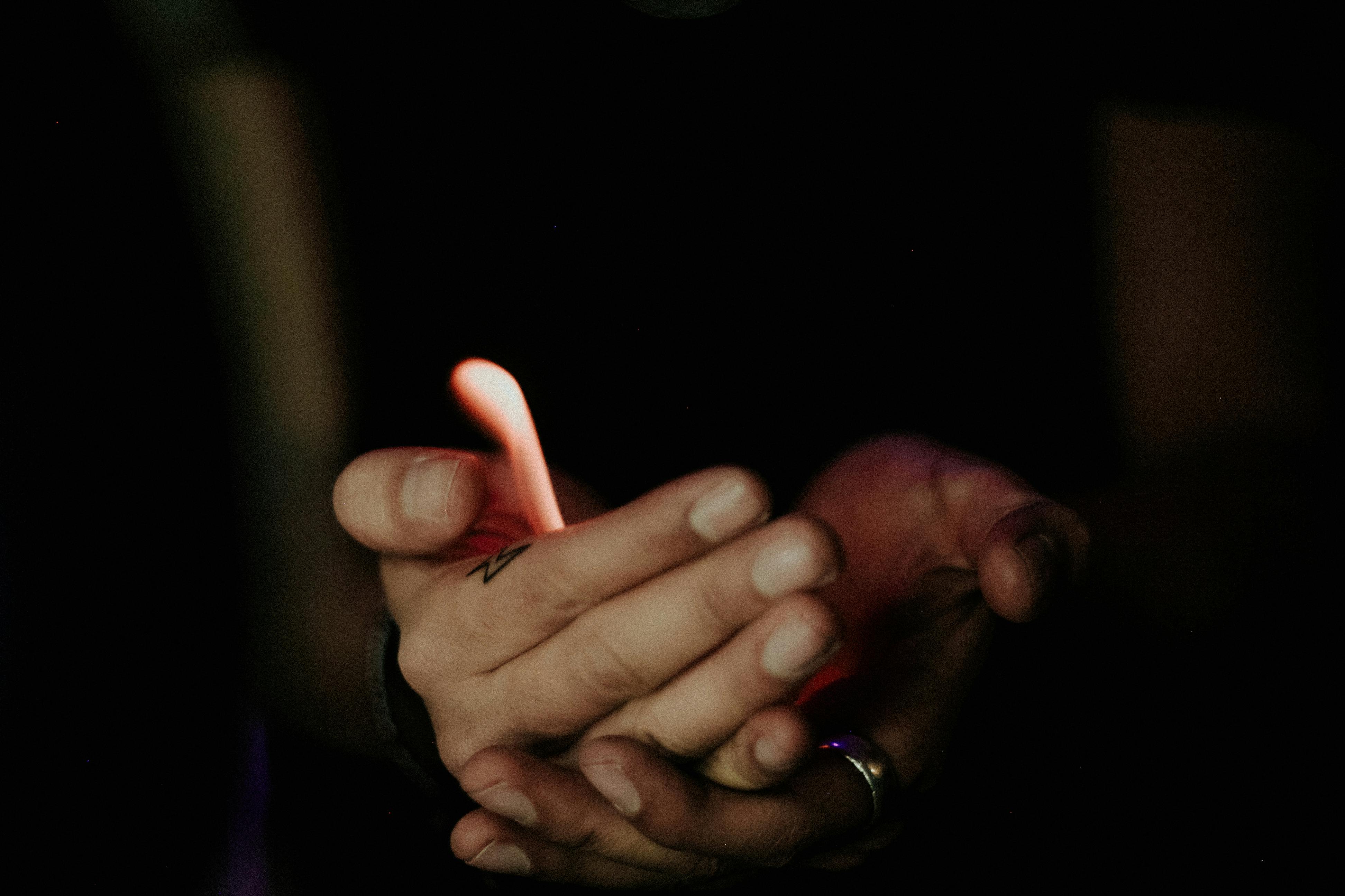 Close-up of Fire Burning in Hands · Free Stock Photo
