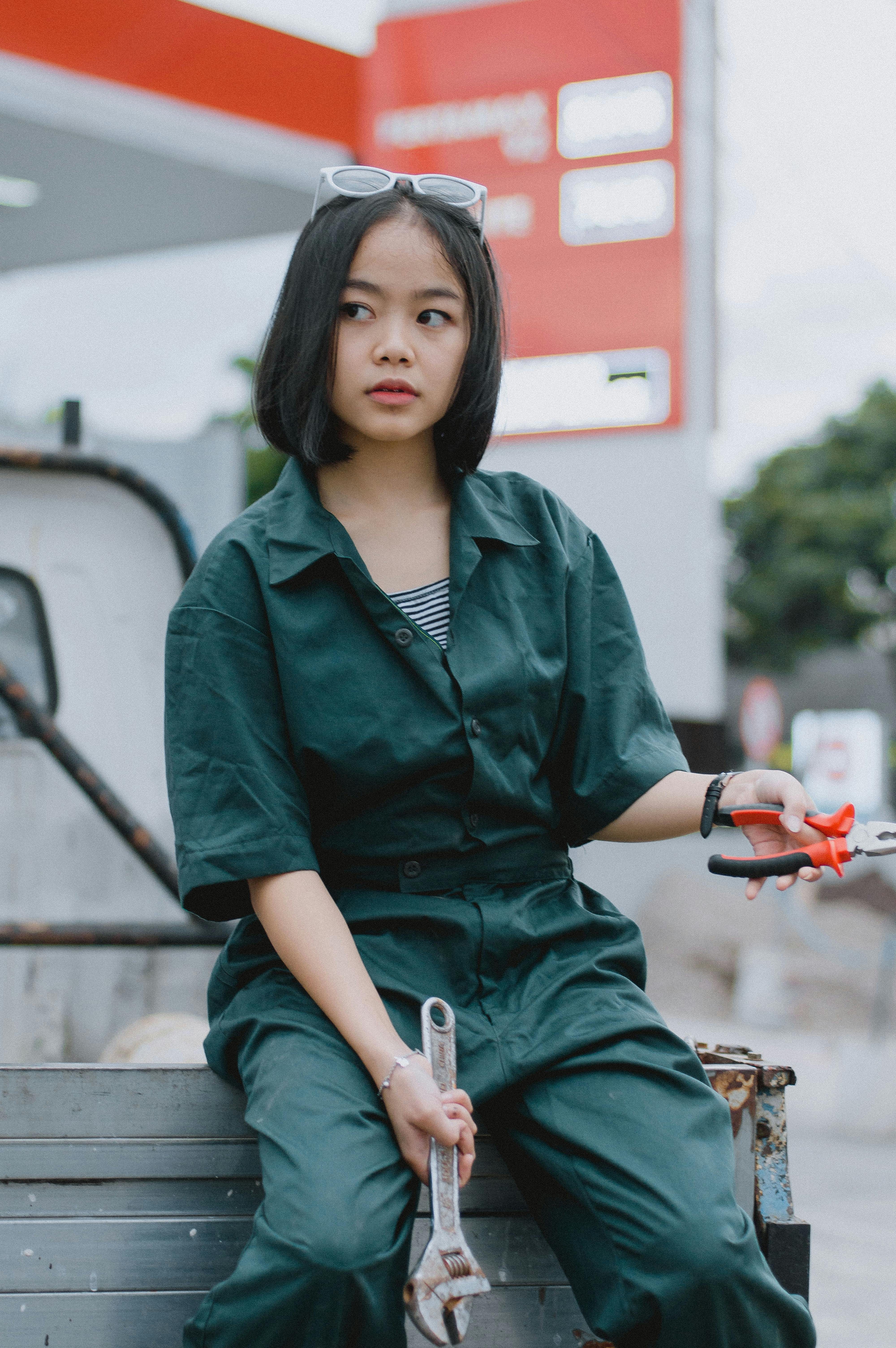 A Woman in Coveralls · Free Stock Photo