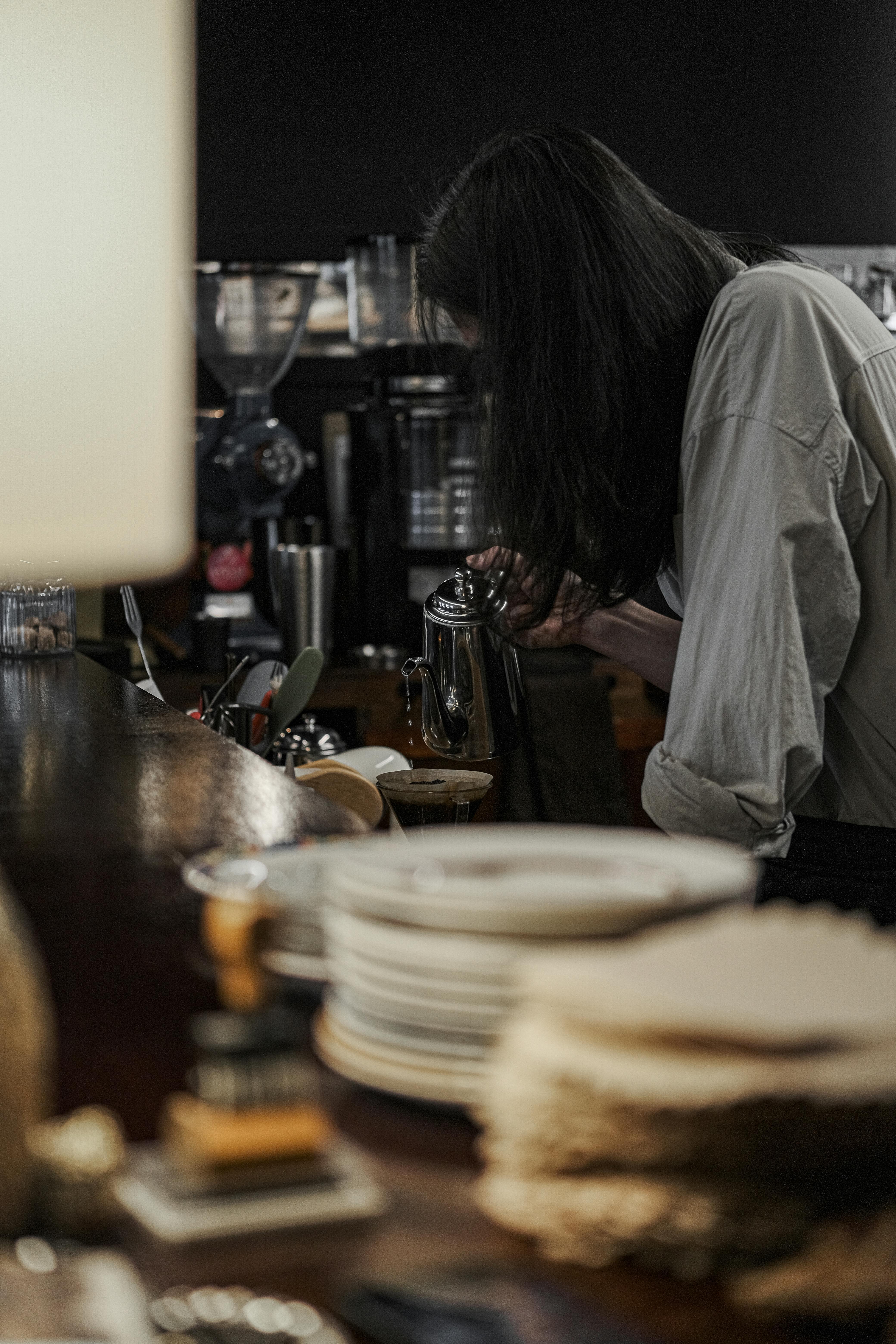 Chef Holding White Tea Cup · Free Stock Photo