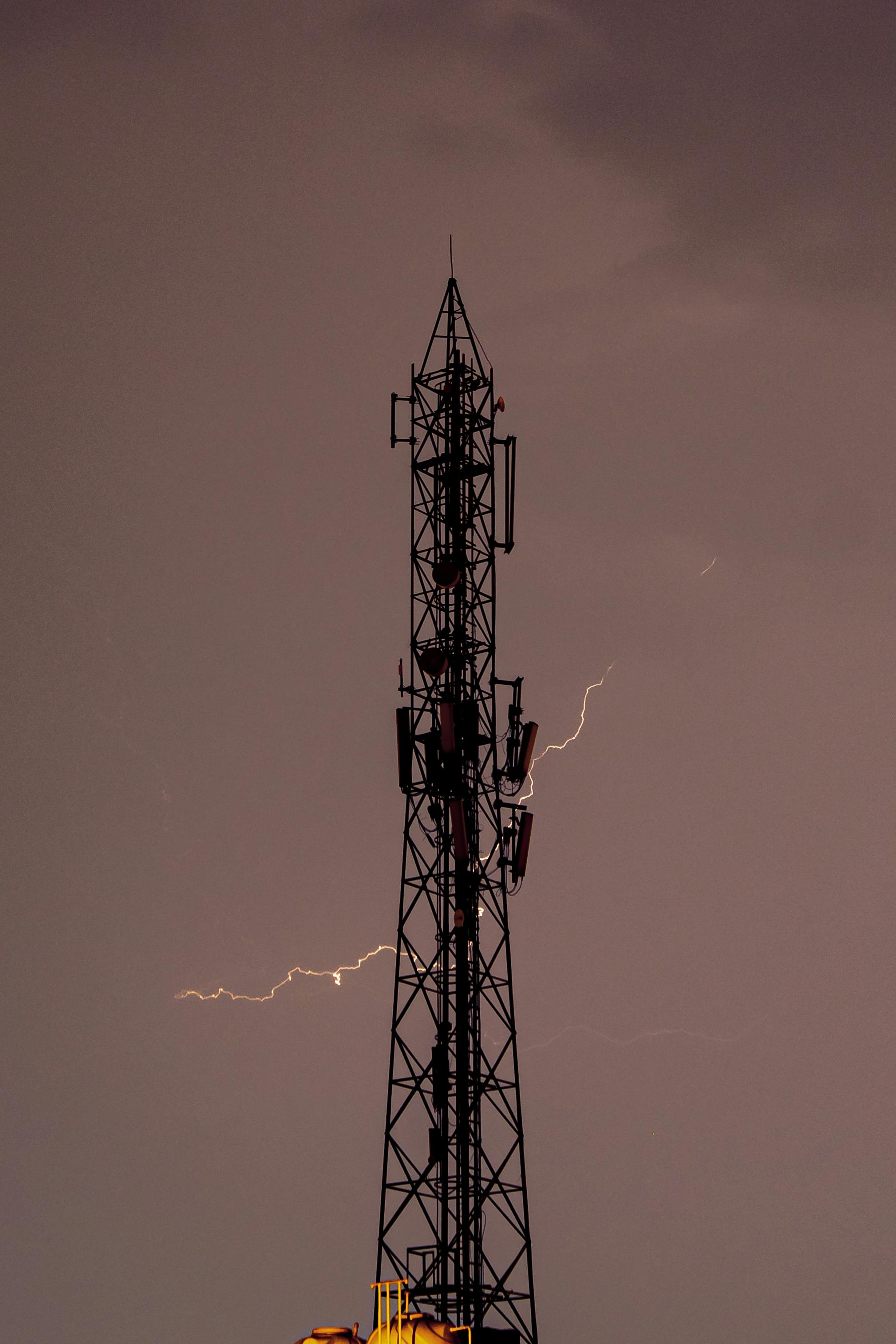 Lightning behind Broadcast Tower · Free Stock Photo