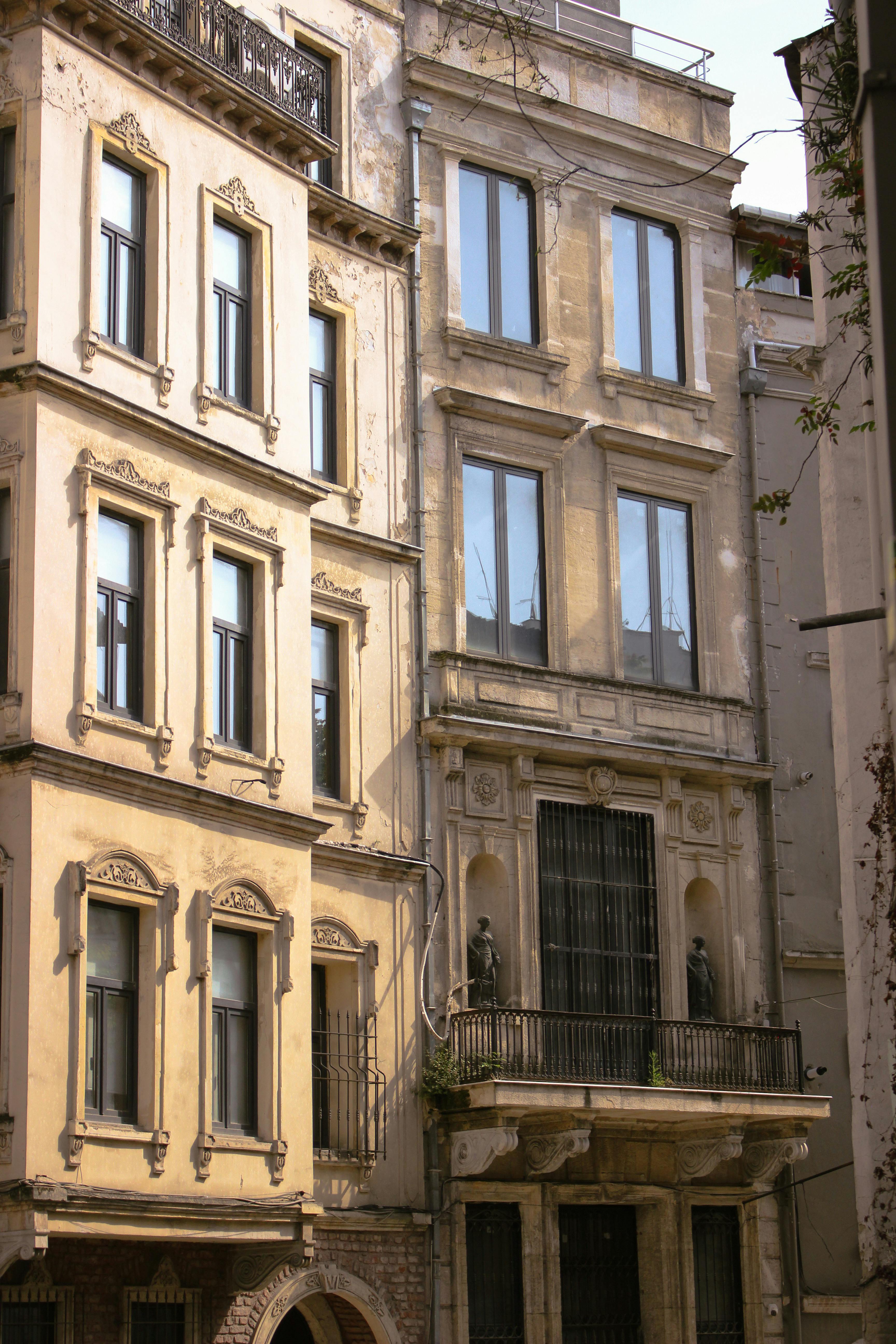 Facades of Narrow Tenements by Street · Free Stock Photo