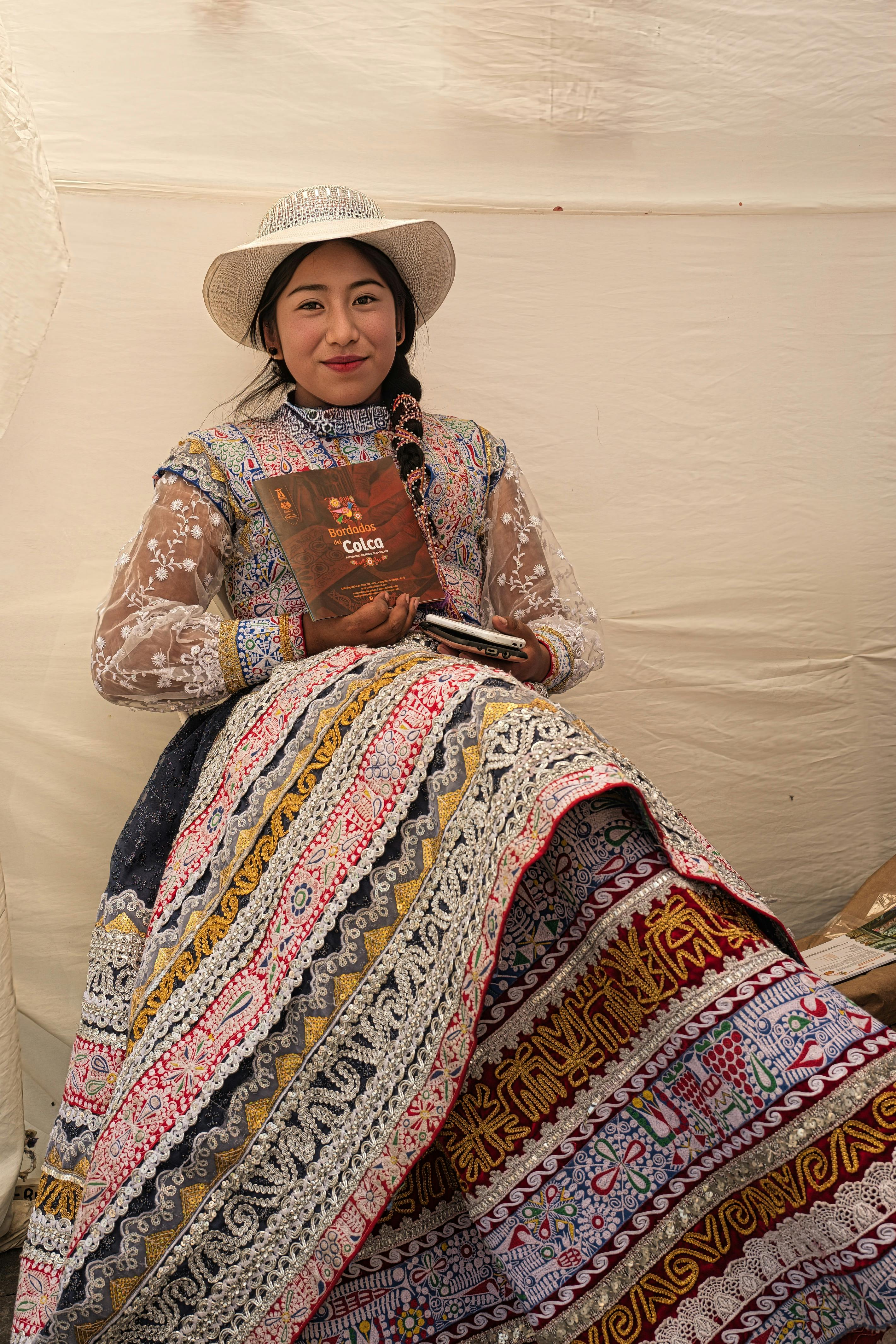 Woman Posing in Traditional Clothing · Free Stock Photo