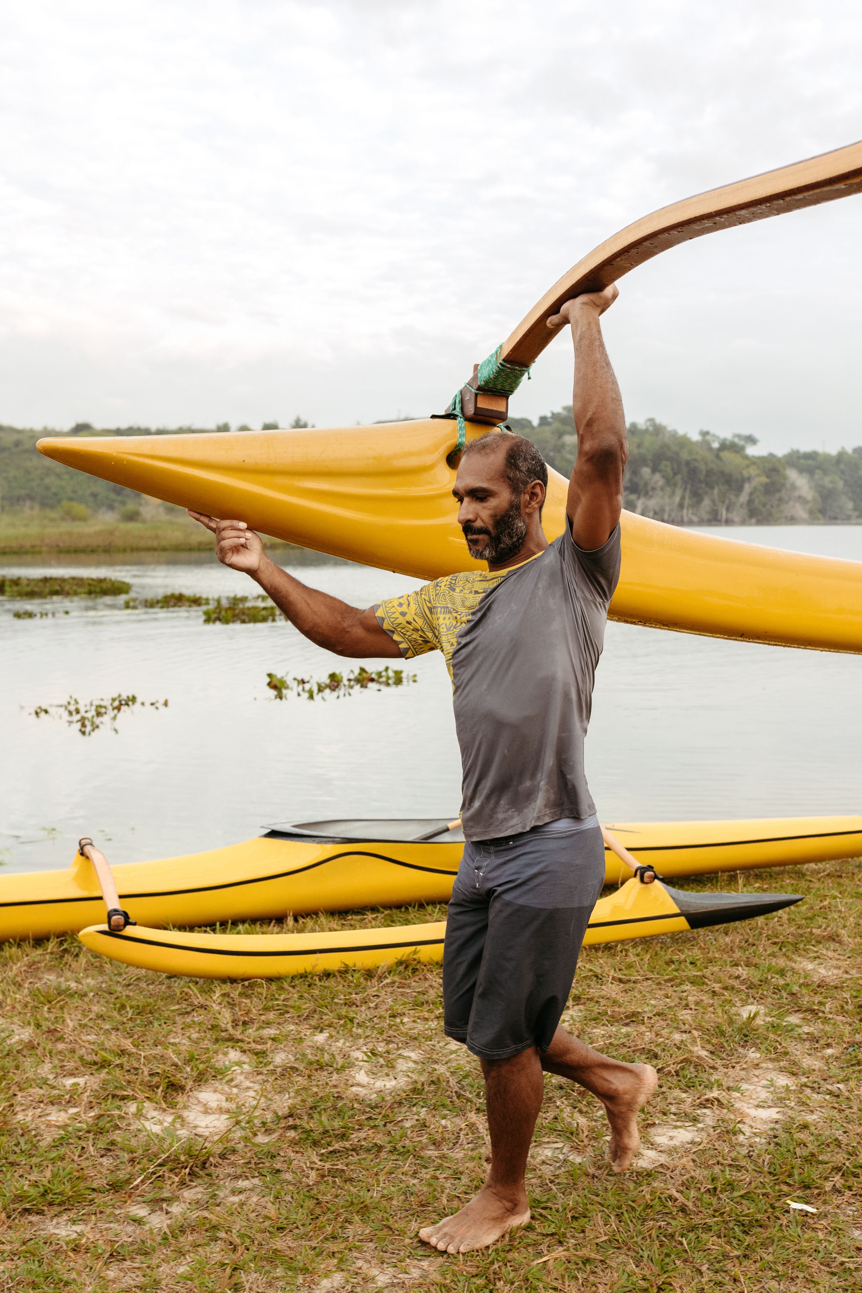 Man Carrying Yellow Kayak · Free Stock Photo